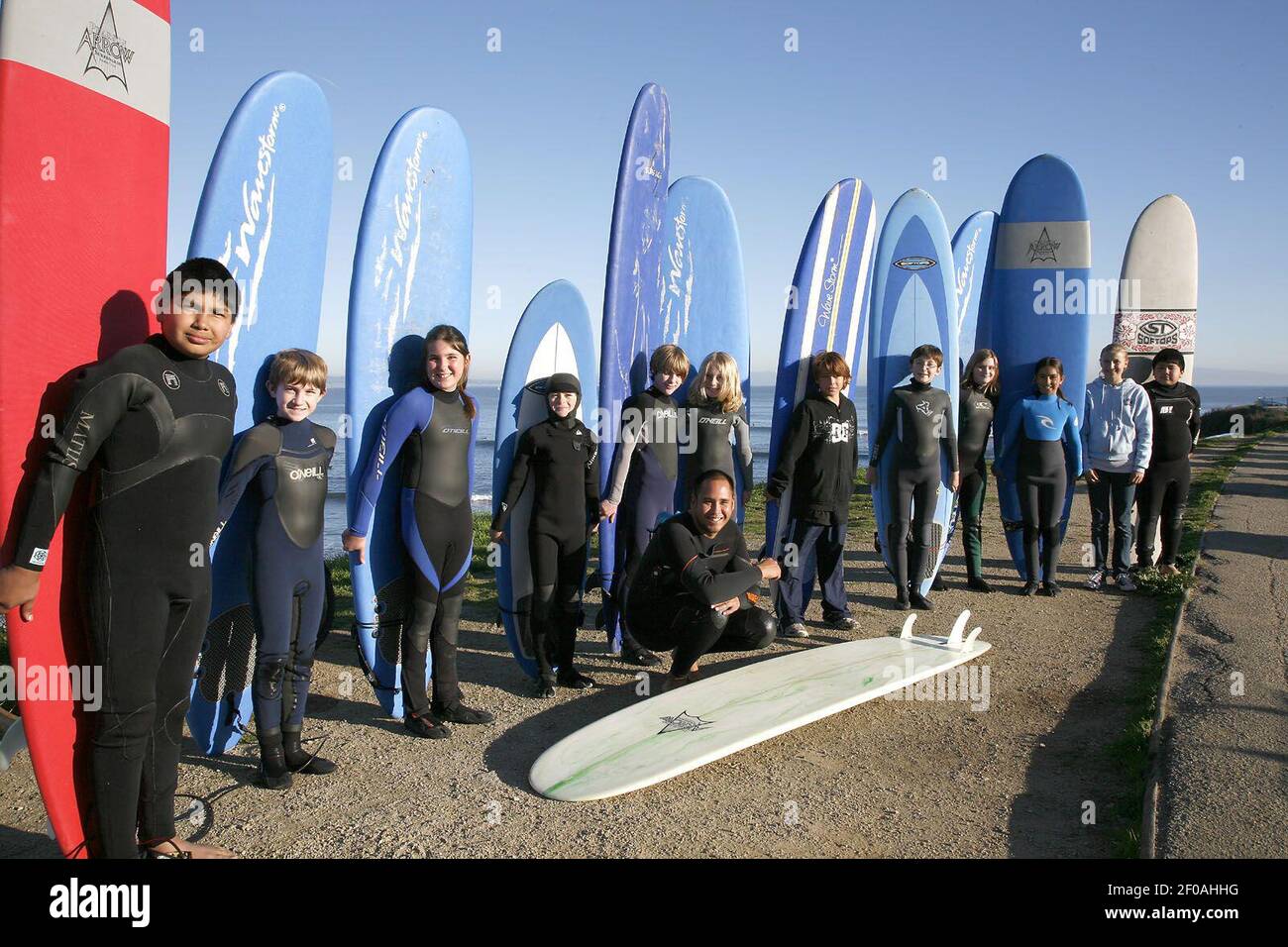 Members of the Branciforte Middle School Surf Club hold their ...