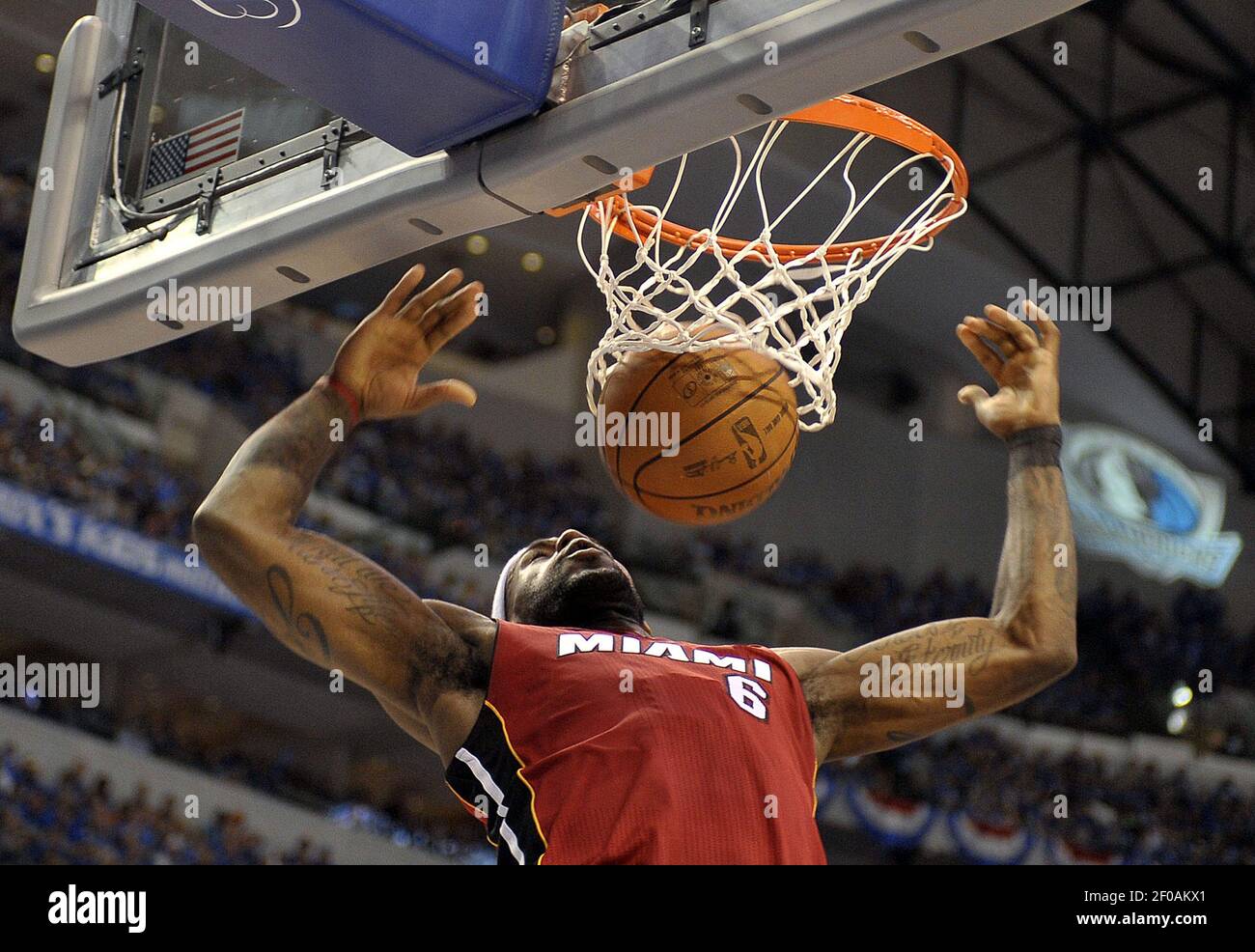 Miami Heat forward LeBron James dunks the ball during the first quarter ...