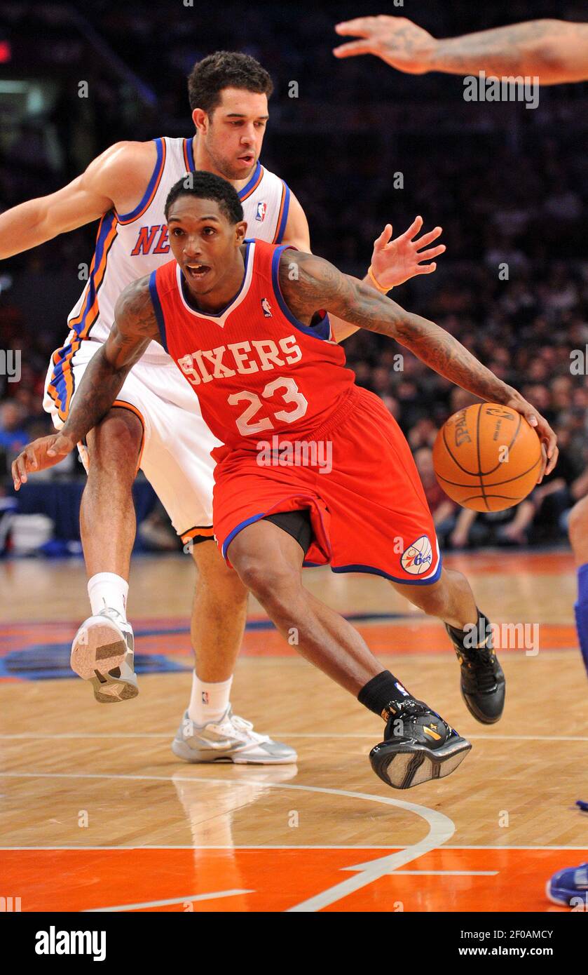 Philadelphia 76ers point guard Louis Williams (23) drives to the basket ...