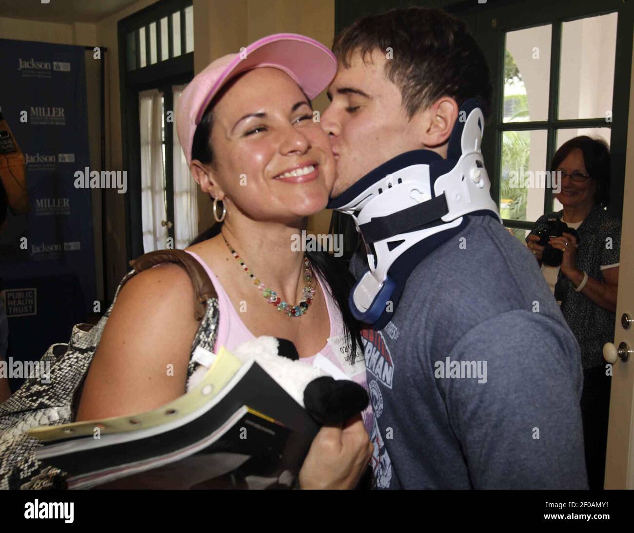 Jorge Valdez, right, kisses his mom Edith Valdez after the press ...