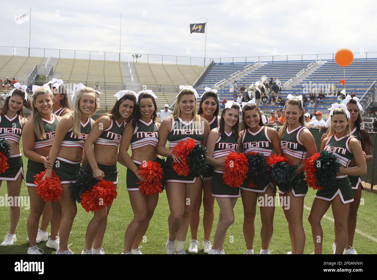 Miami Hurricane cheerleaders poses for the picture before the Miami ...