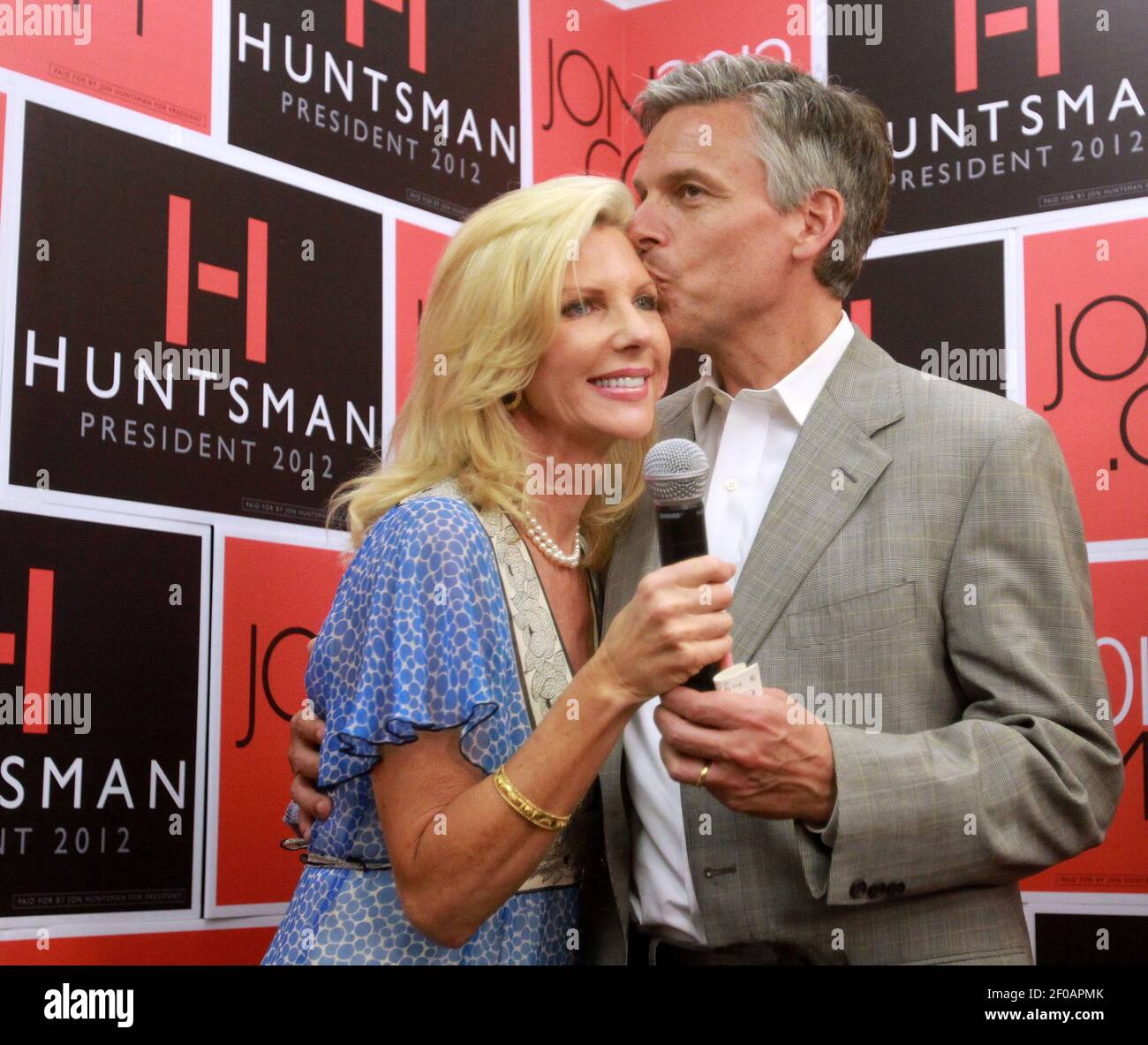 Former Utah Republican Gov. Jon Huntsman kisses his wife, Mary Kaye ...