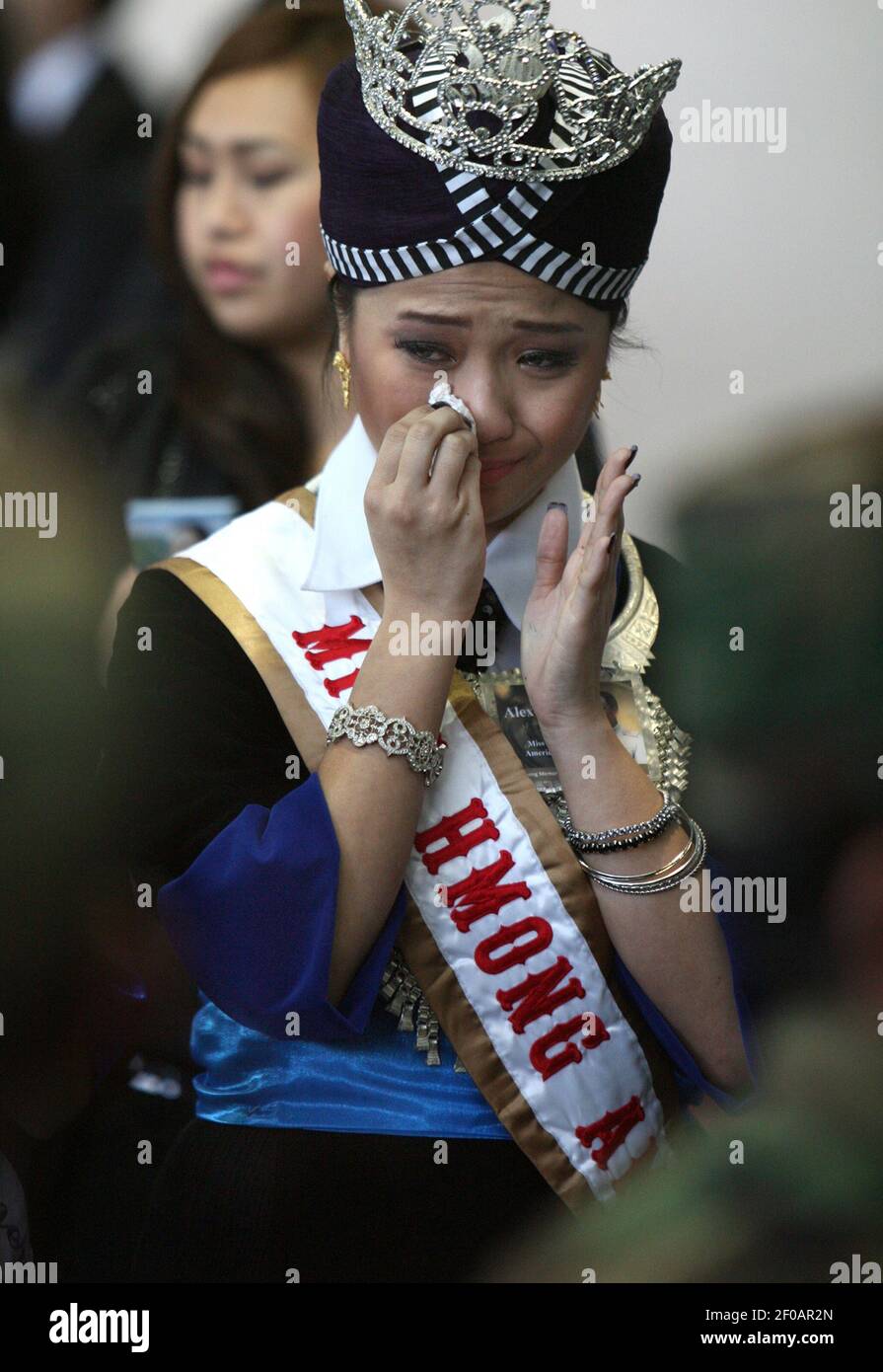 Miss Hmong America, Alex Chang, of St. Paul, Minnesota, wipes away ...