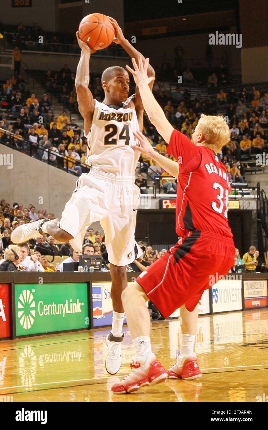 Missouri guard Kim English looks to pass while being defended by ...
