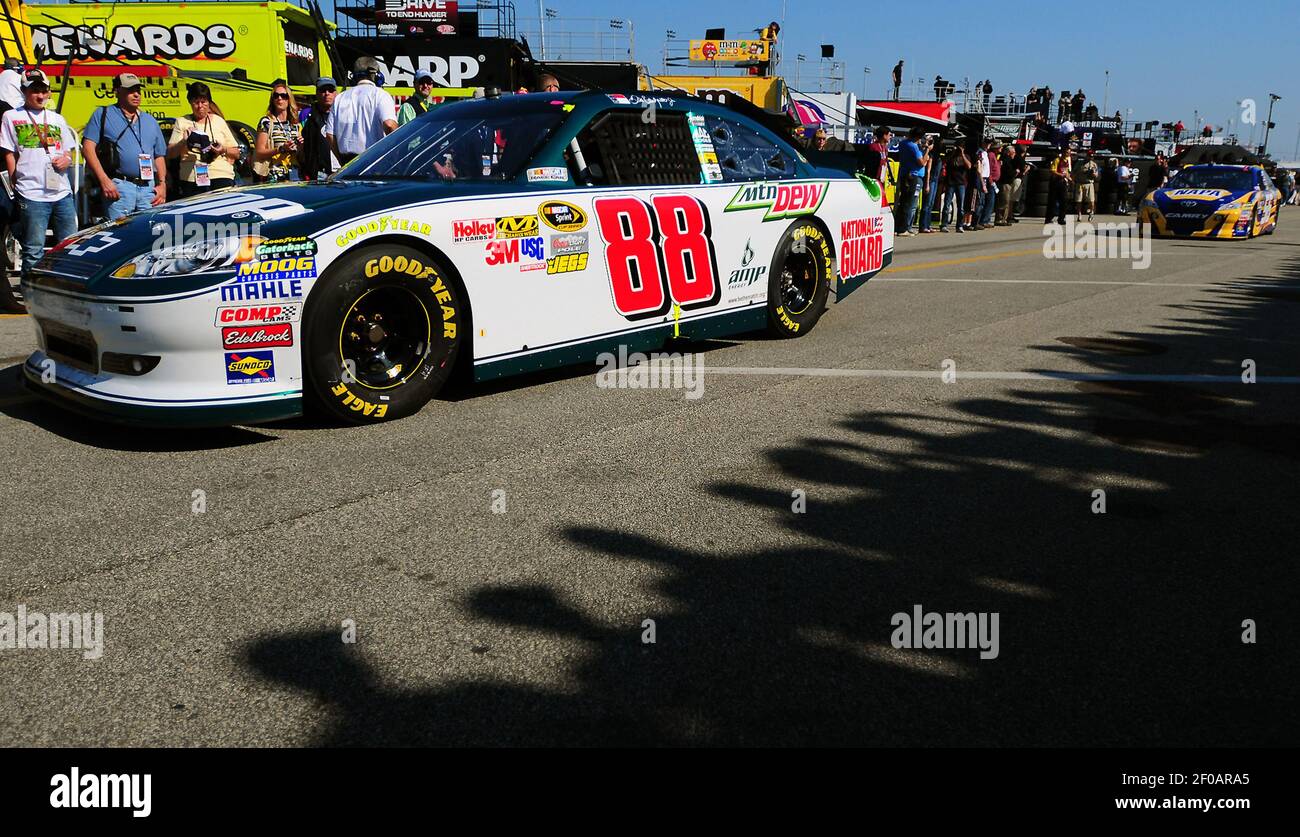 NASCAR Sprint Cup Series driver Dale Earnhardt Jr. exits the garage to ...