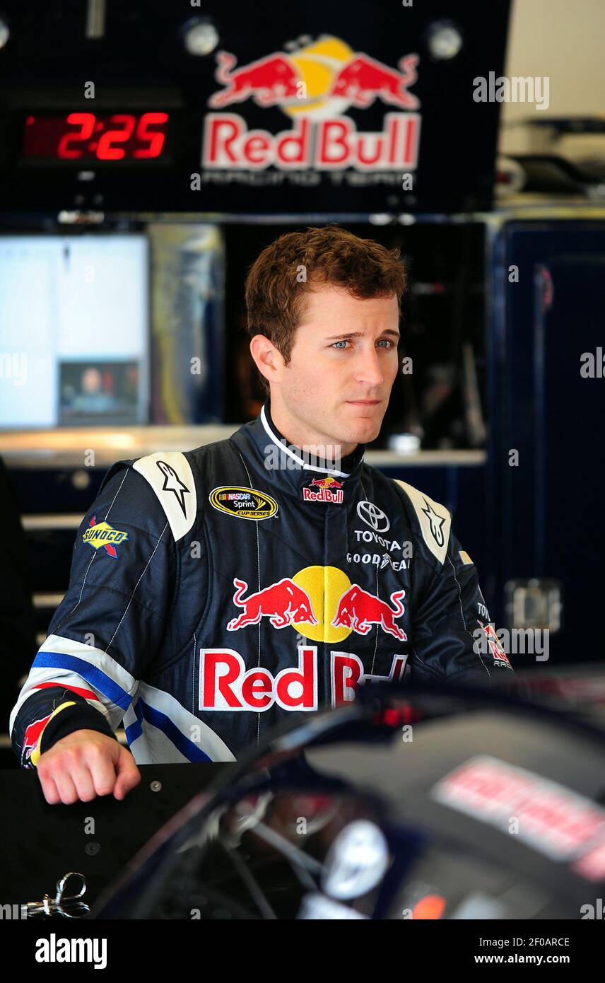 NASCAR Sprint Cup Series driver Kasey Kahne waits by his car for ...