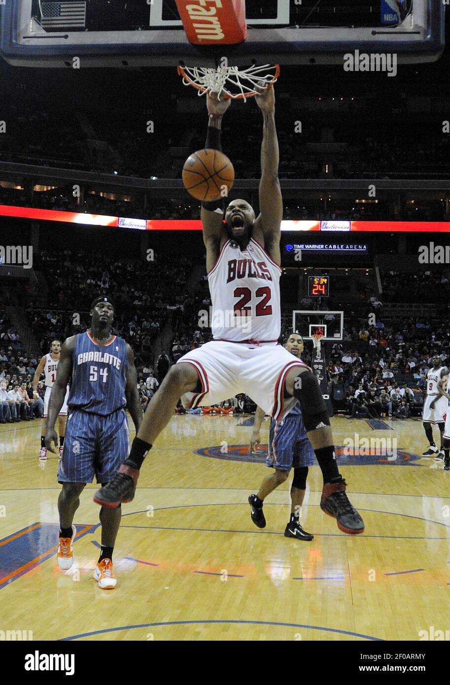 The Chicago Bulls' Taj Gibson (22) gets a slam against the Charlotte ...