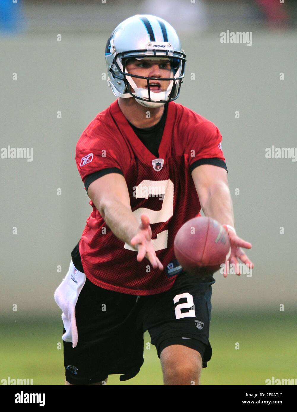 Carolina Panthers quarterback Jimmy Clausen pitches the ball to a ...