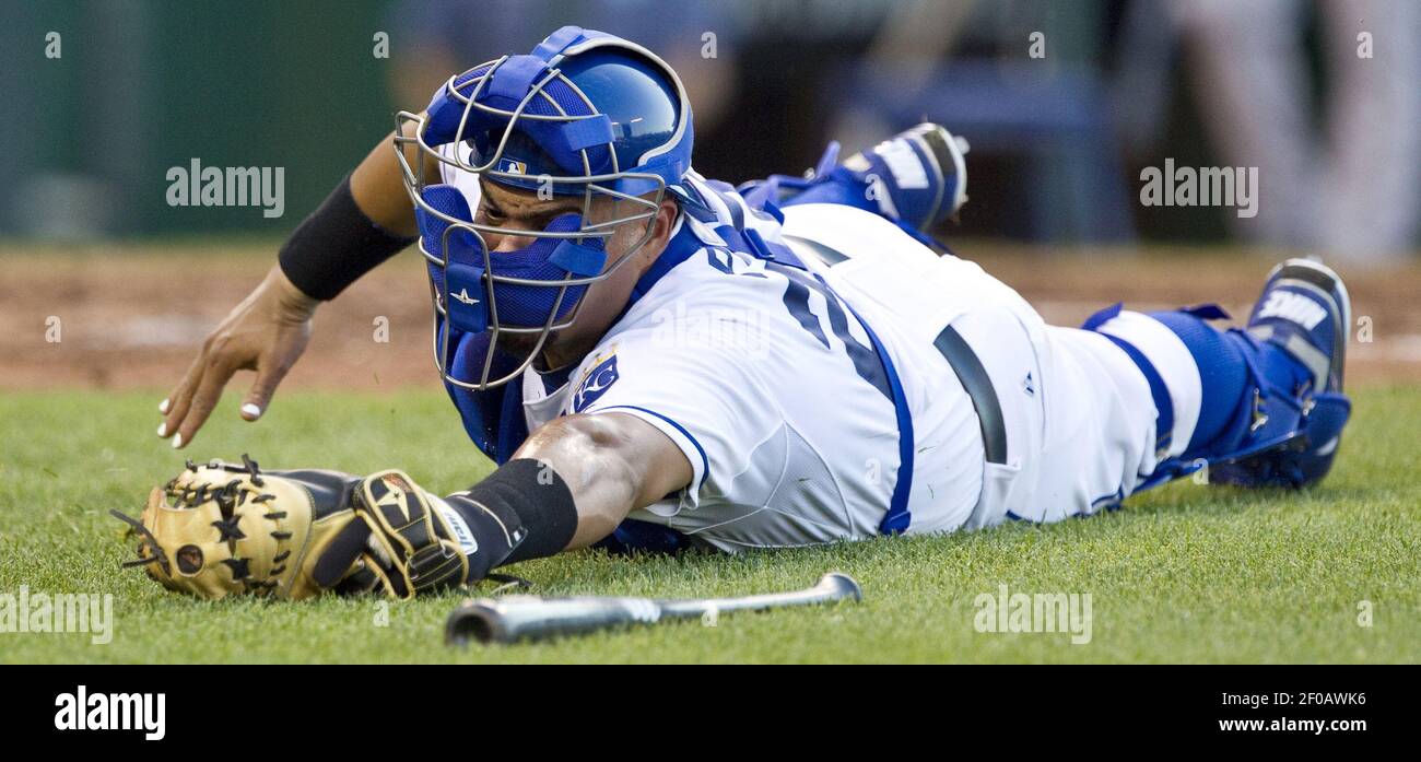 Kansas City Royals catcher Brayan Pena (27) dove to stop the throw to ...
