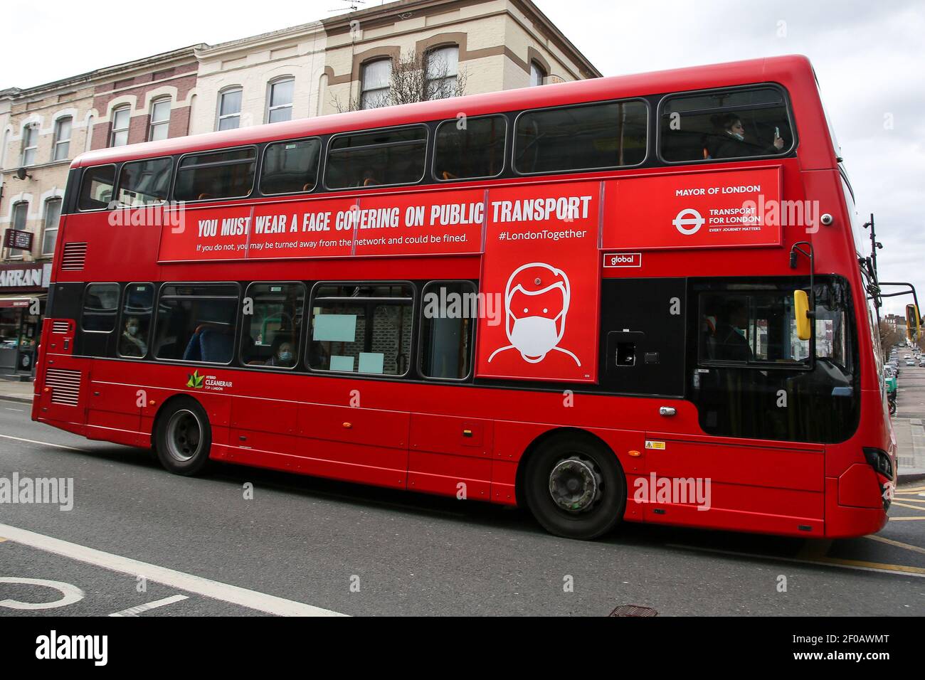 Wearing a face covering on public transport hi-res stock photography ...