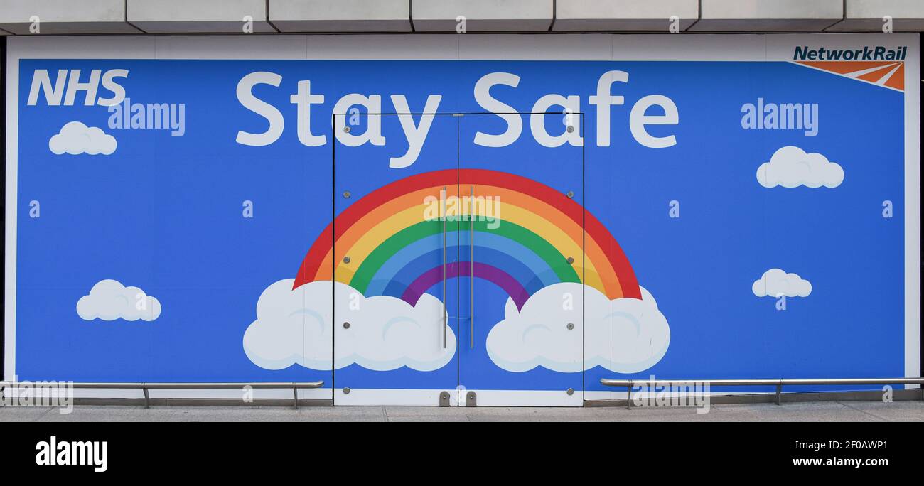 NHS slogan Stay Safe seen in London Bridge train station. (Photo by ...