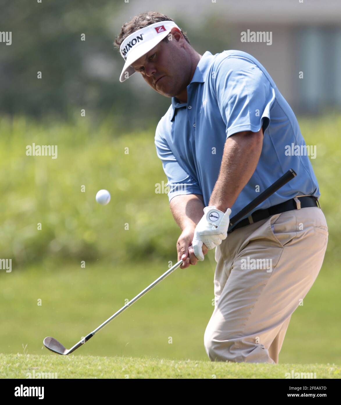 Brian Smock chips up to the second hold green during the Rex Hospital ...