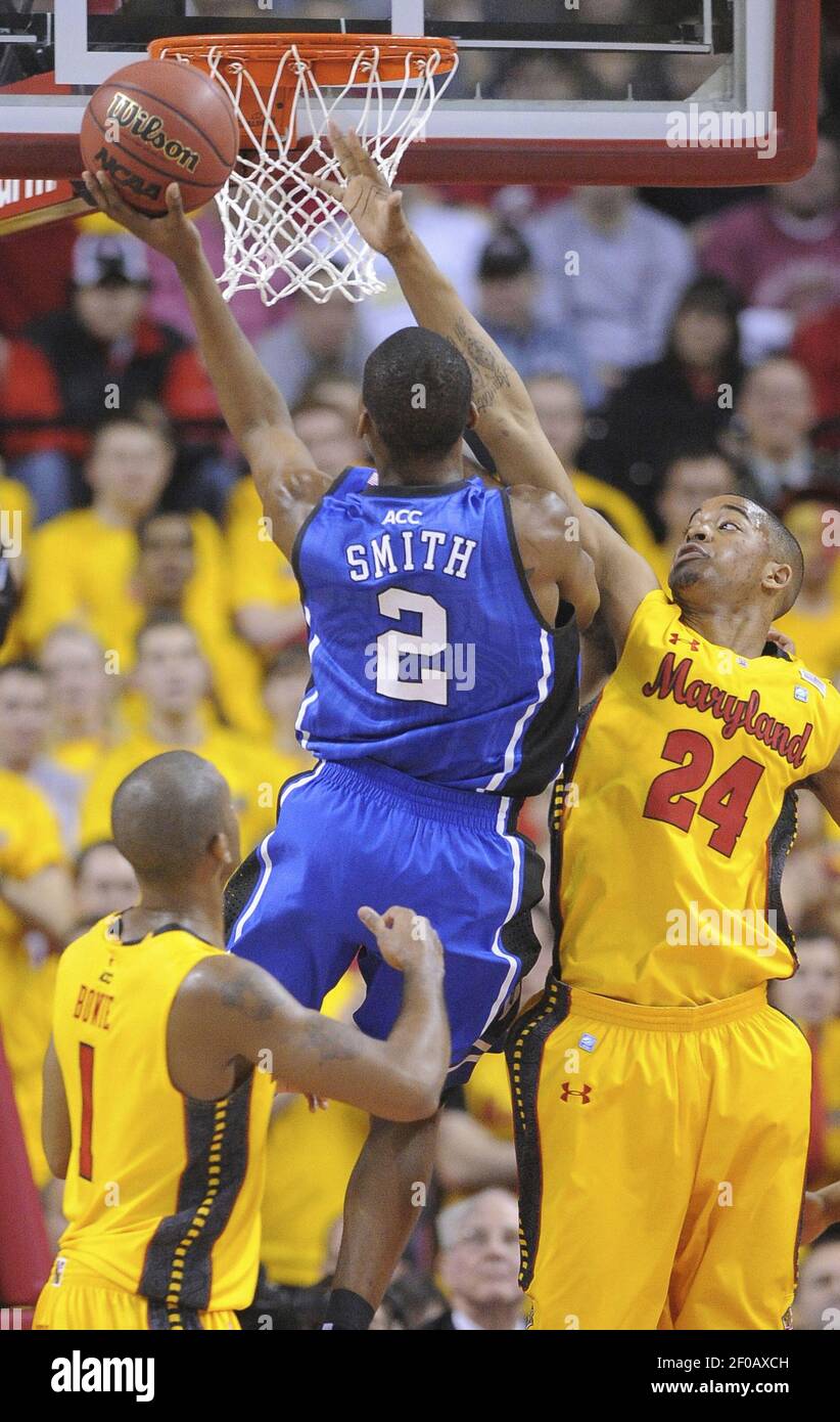 Duke's Nolan Smith scores two points against Maryland's Sean Mosley (24 ...