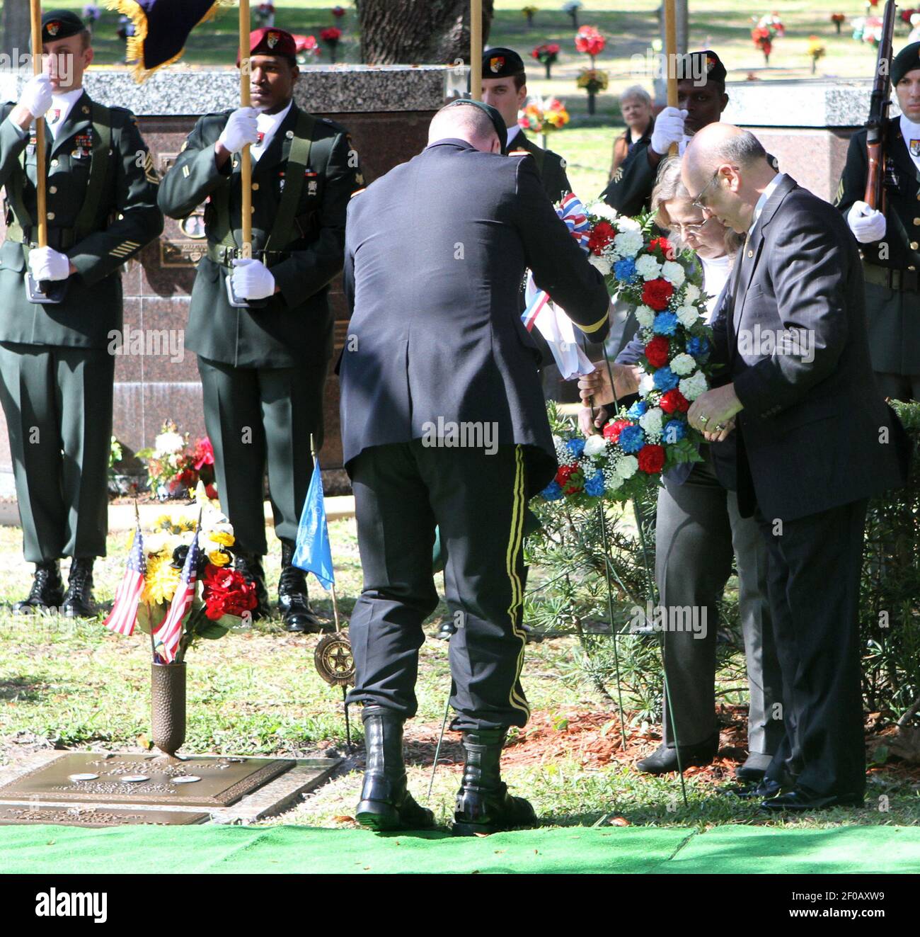 Lt. General John Mulholland presents a wreath to the parents of U.S. Army Staff Sgt. Robert J ...
