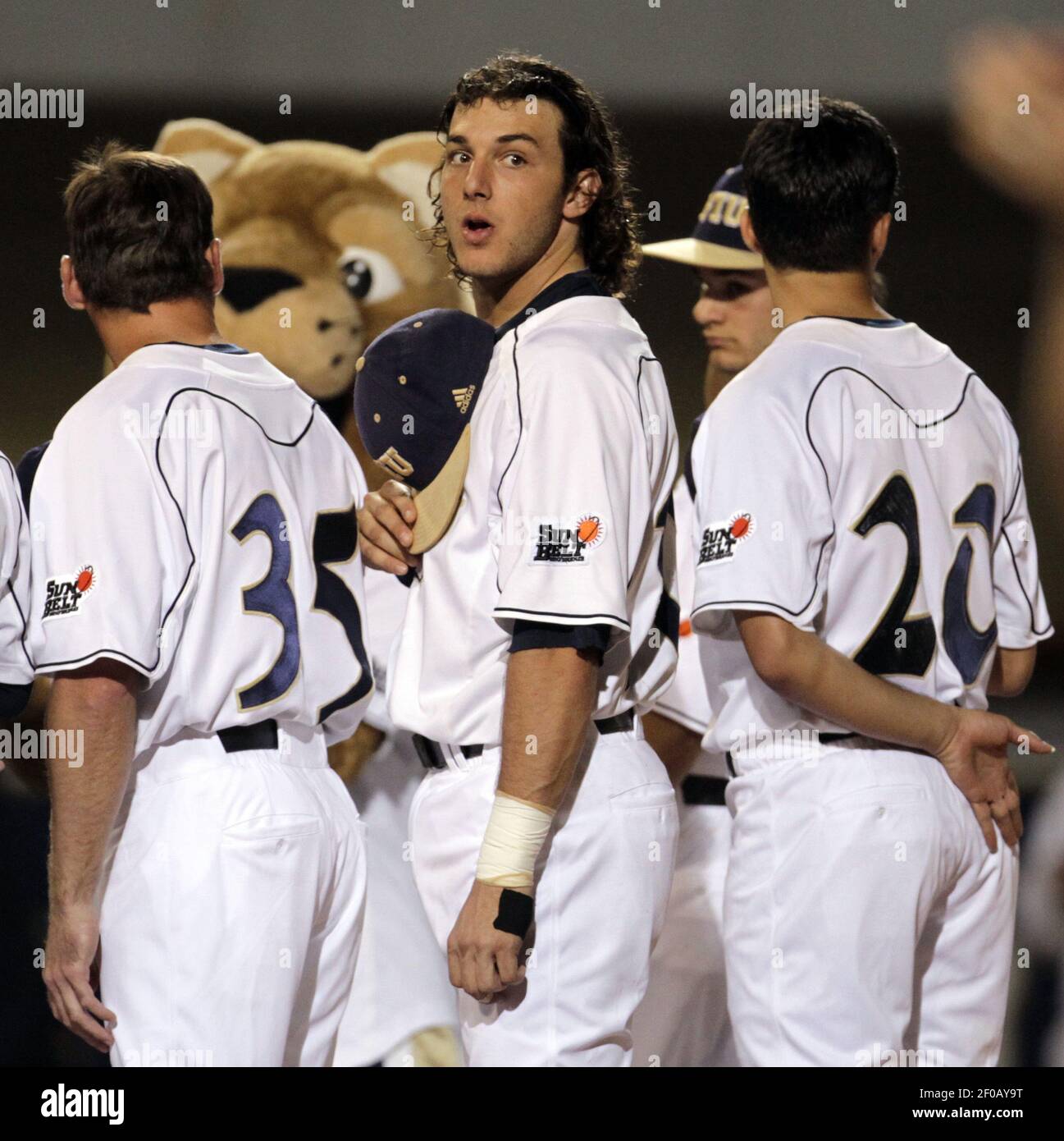 Florida International University's Garrett Wittels looks over his ...