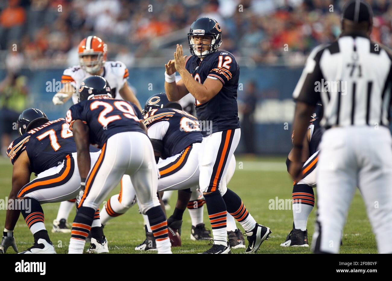 Chicago Bears quarterback Caleb Hanie (12) calls a timeout early in the ...