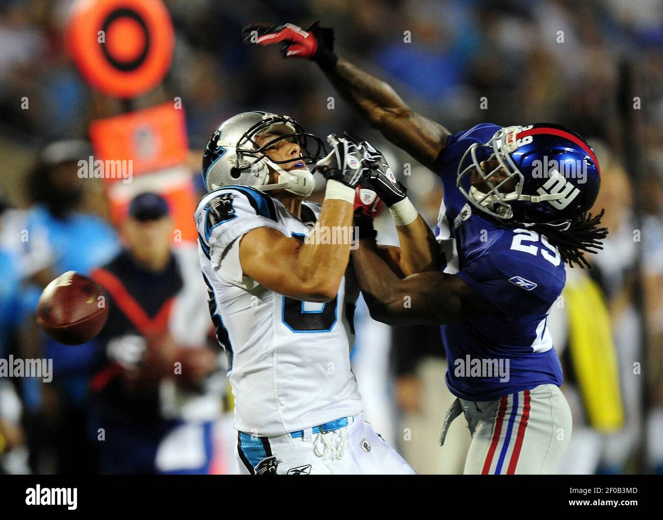 The Carolina Panthers' Charly Martin (83) and New York Giants' Brian ...