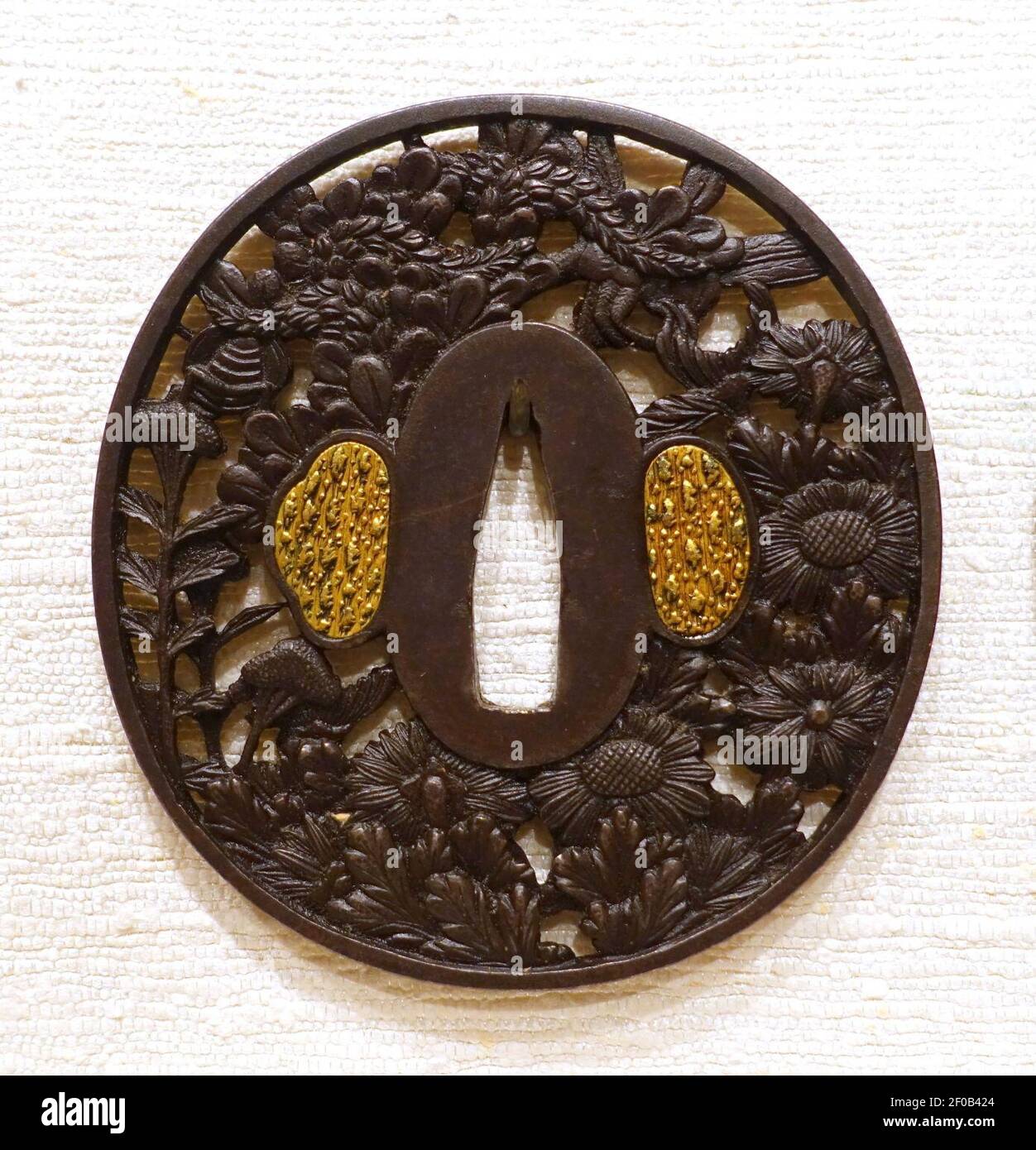 Plants of Early Autumn, tsuba, Japan, iron, gold Stock Photo - Alamy