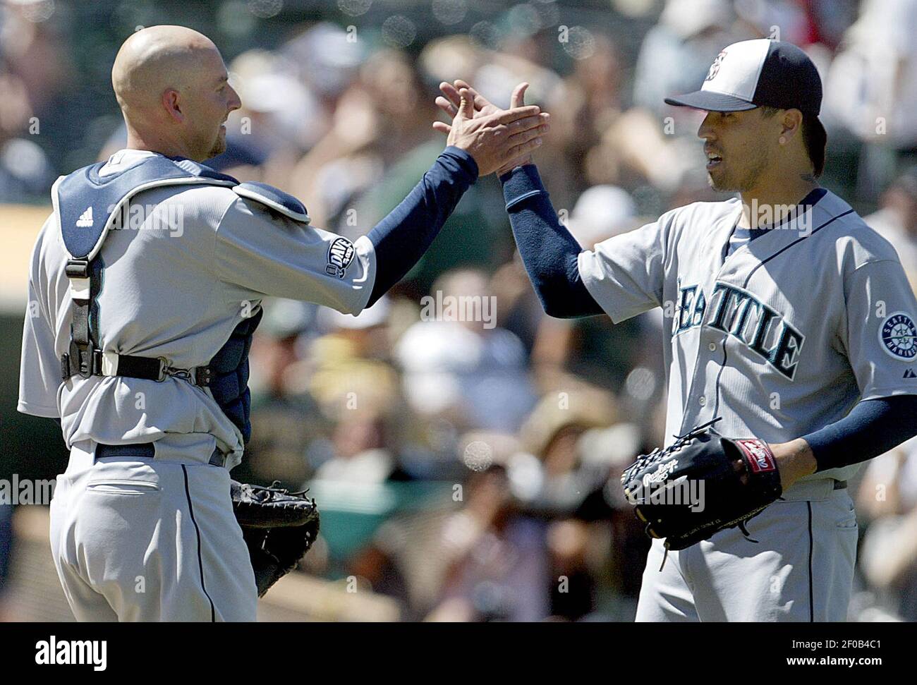 Seattle Mariners catcher Josh Bard, left, and closing pitcher Brandon ...