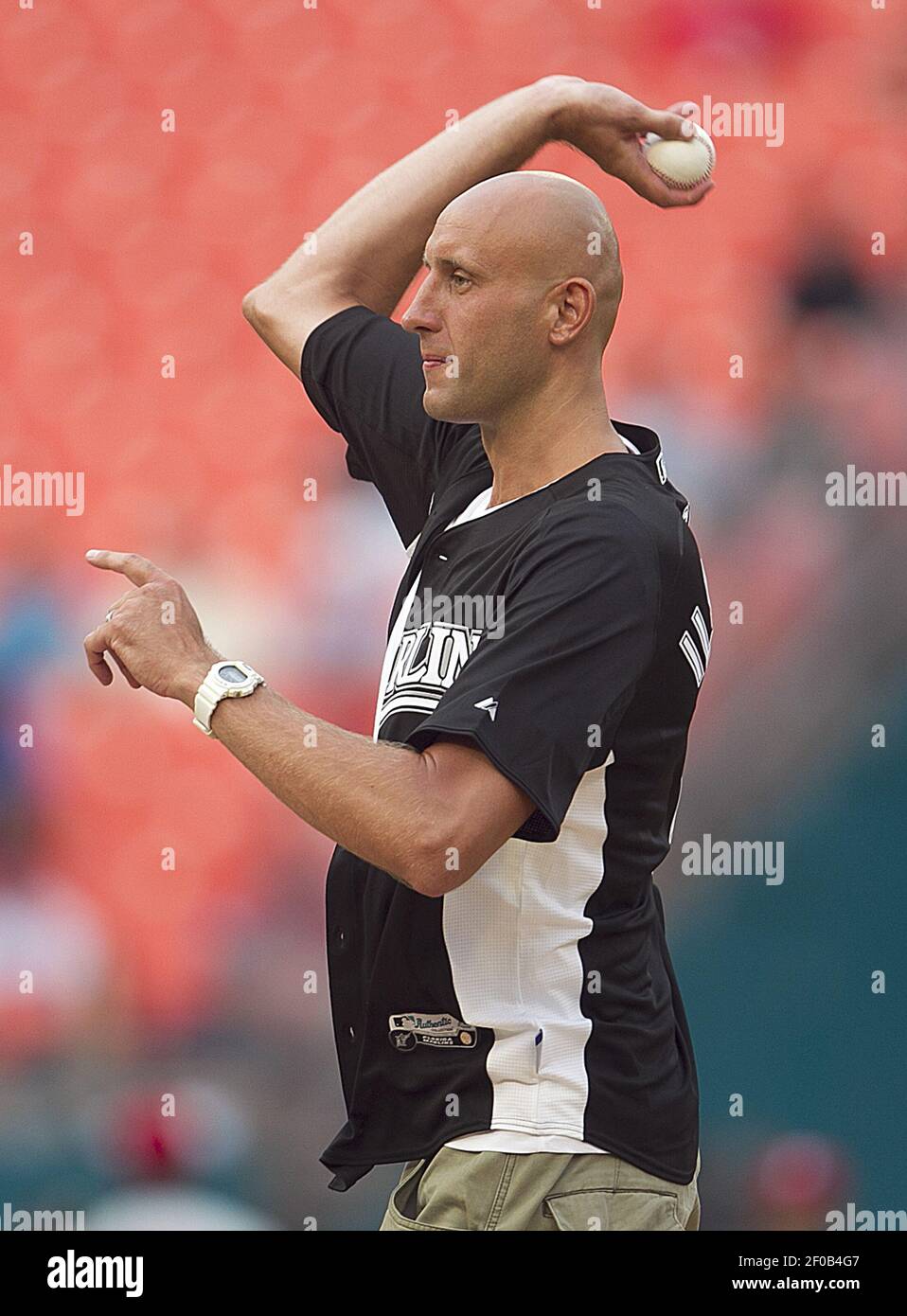 Miami Heat's Zydrunas Ilgauskas?throws out the first pitch before the ...