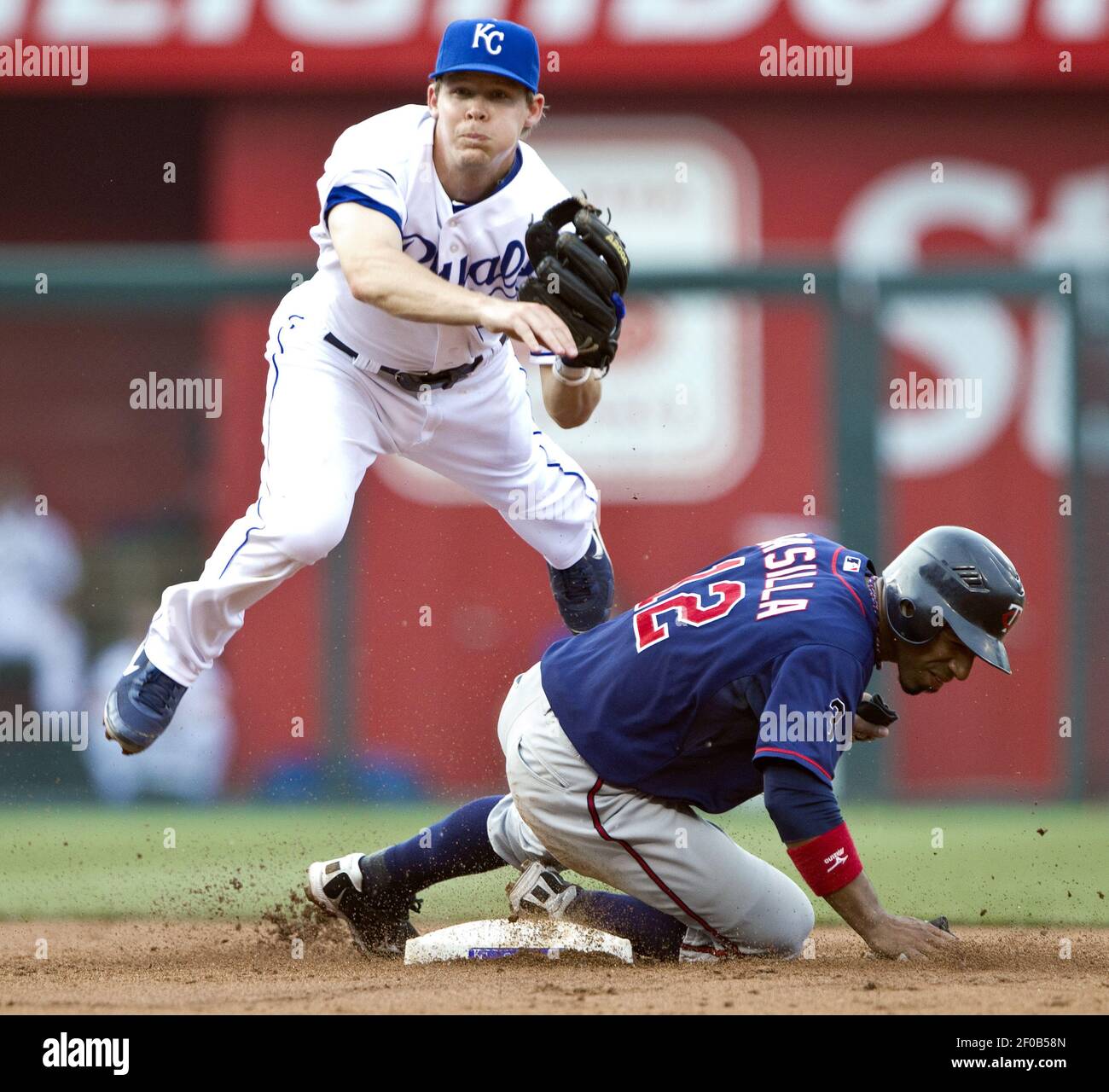 Kansas City Royals second baseman Chris Getz (17) completes a double ...