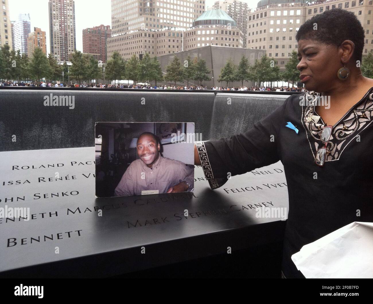 Elsie Goss-Caldwell of West Philadelphia, Pennsylvania holds a photo of ...