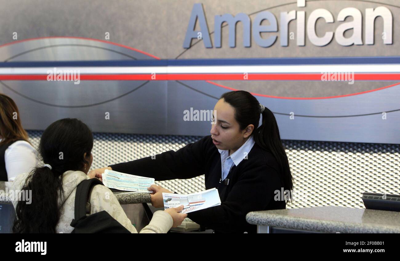 A ticket agent at the American Airlines terminal at O'Hare ...