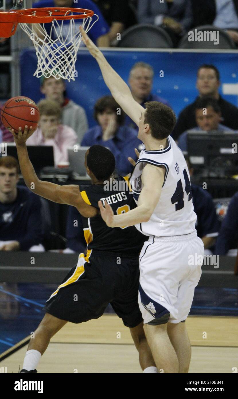 Virginia Commonwealth's Darius Theus, left, and Butler's Andrew Smith ...