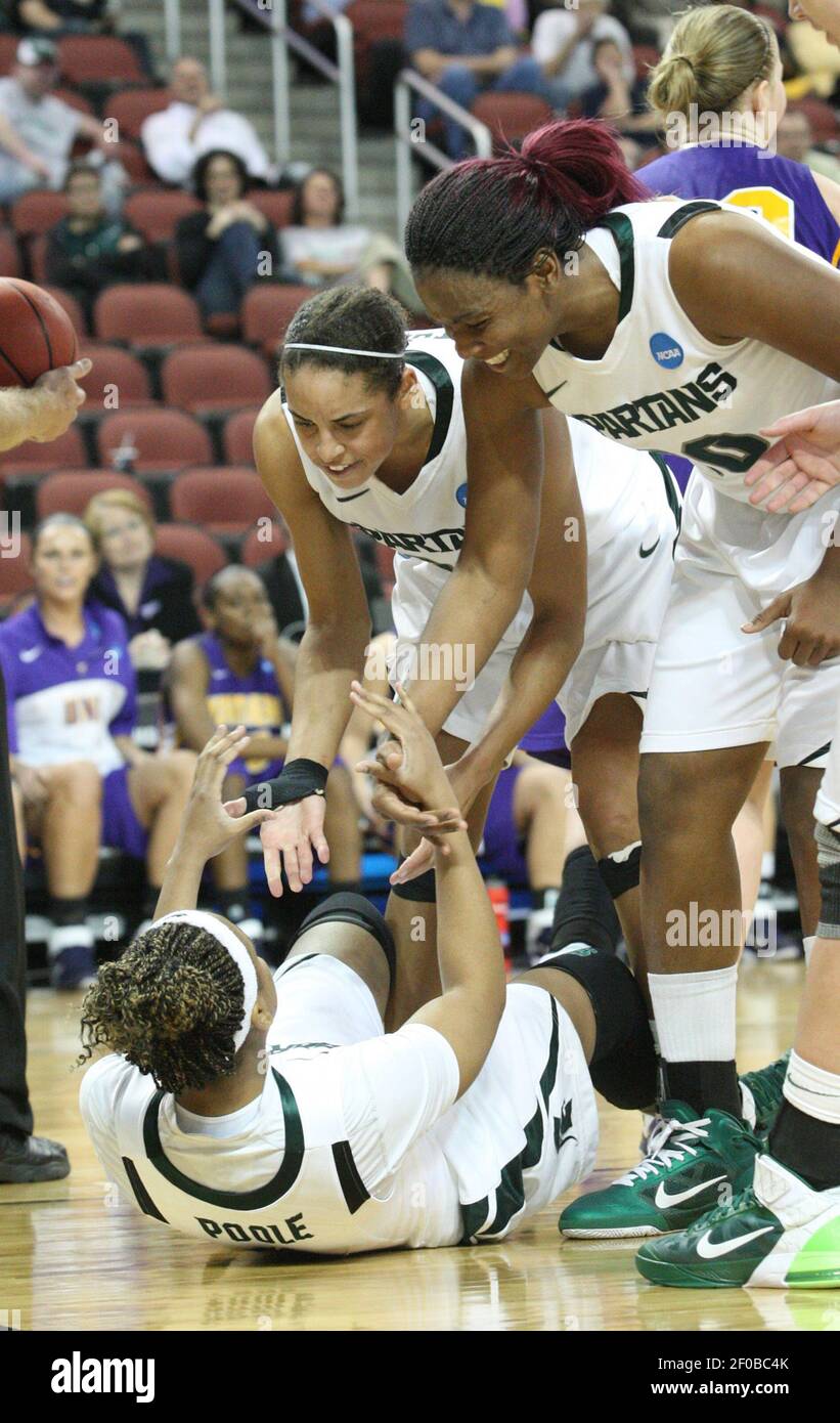 Michigan State's Brittney Thomas, center, and Lykendra Johnson, left ...