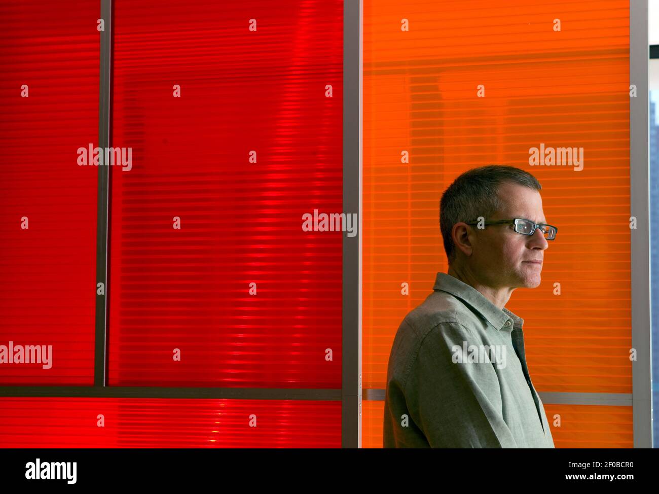 Christian Wiman, editor of Poetry magazine, stands at his office on ...