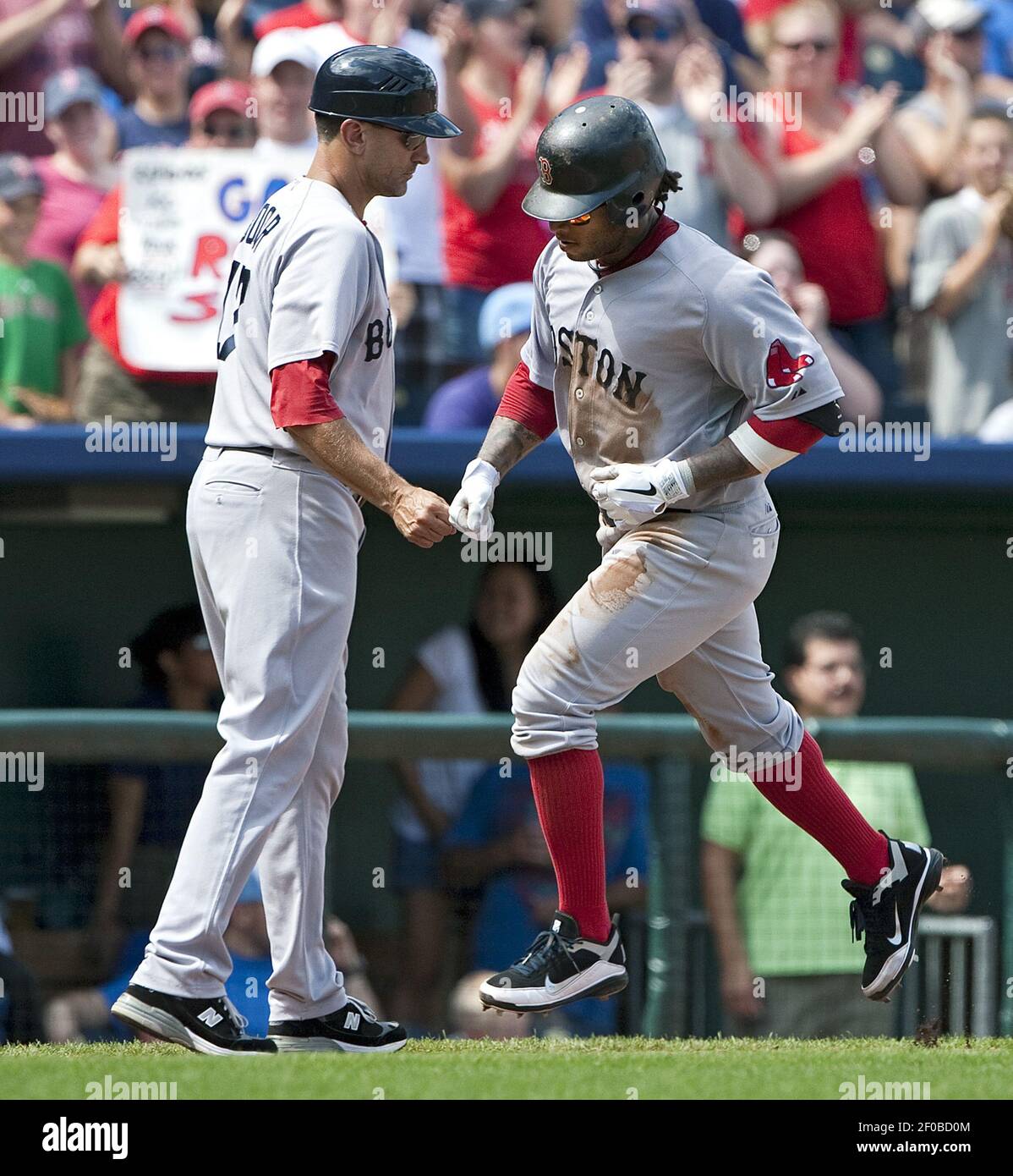 Boston Red Sox third base coach Tim Bogar congratulated Darnell ...