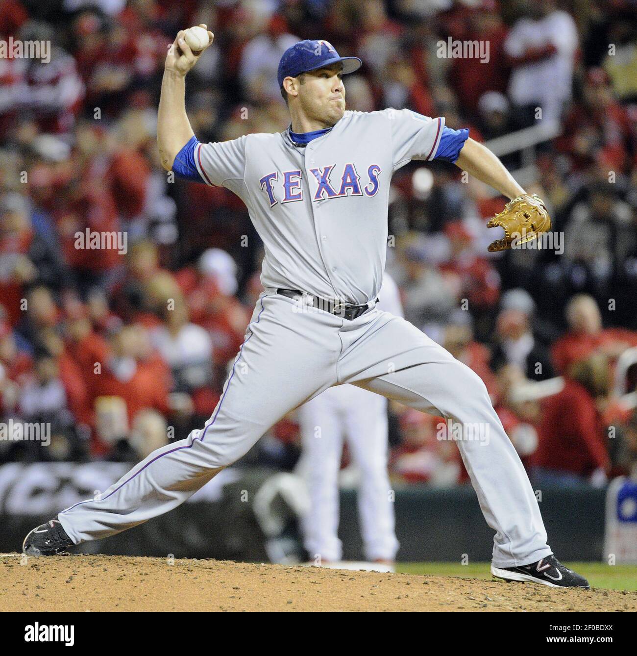 Texas Rangers starting pitcher Colby Lewis works against the St. Louis ...