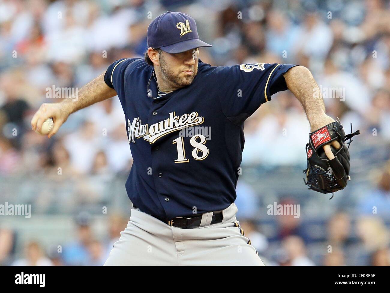 Shaun Marcum of the Milwaukee Brewers delivers a pitch against the New ...