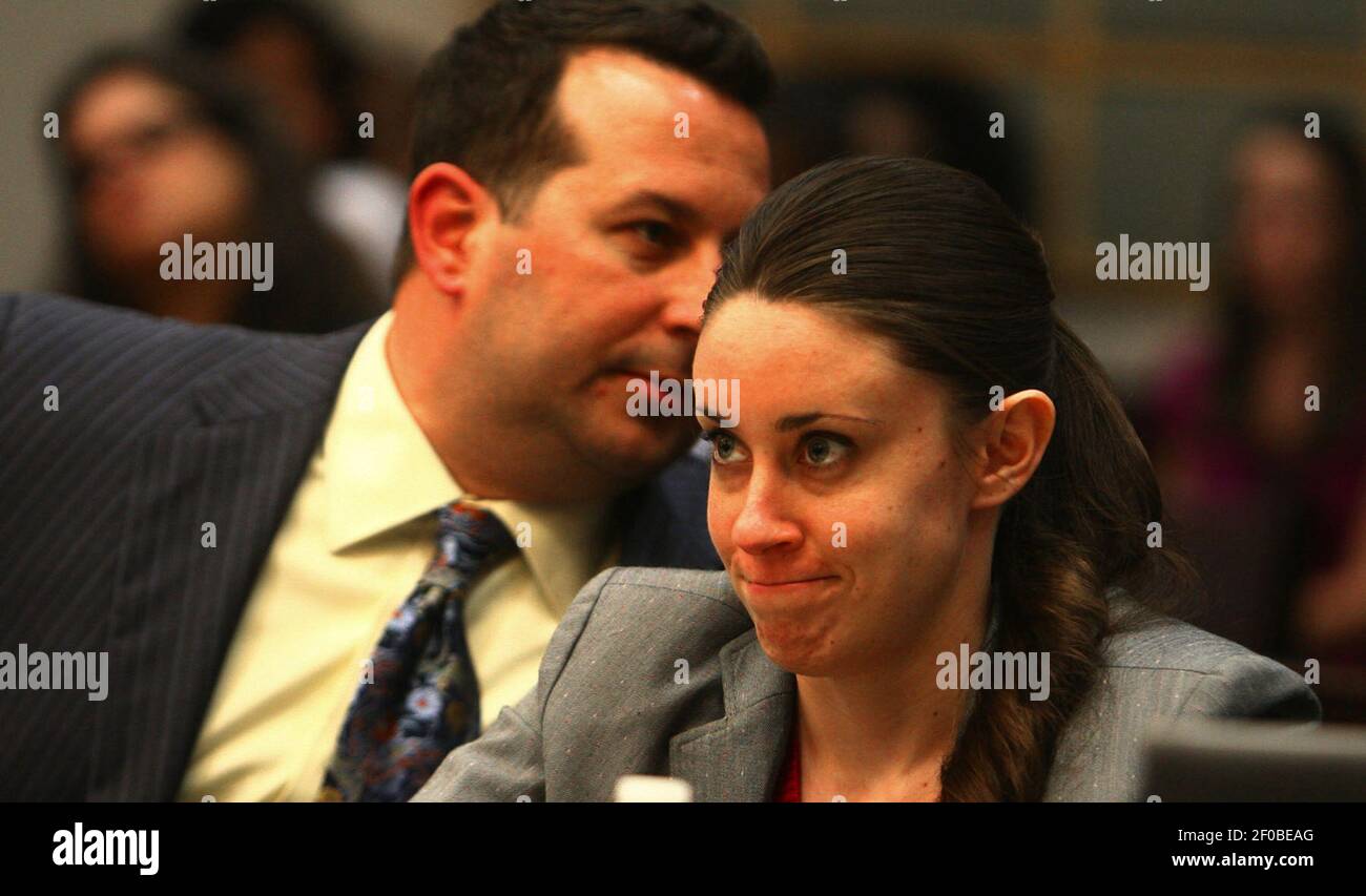 Casey Anthony smiles at her brother Lee Anthony during a hearing at the ...
