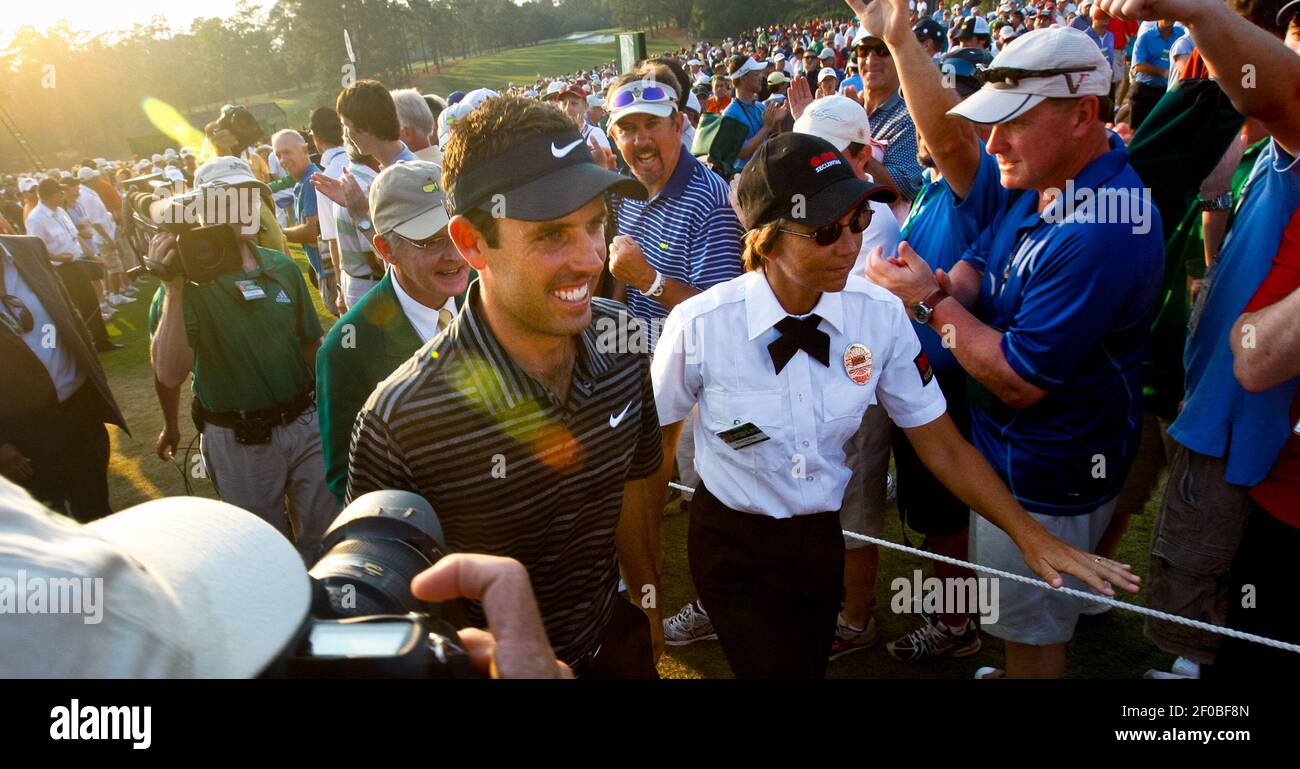 Charl Schwartzel is escorted to Butler Cabin after he winning the 75th ...