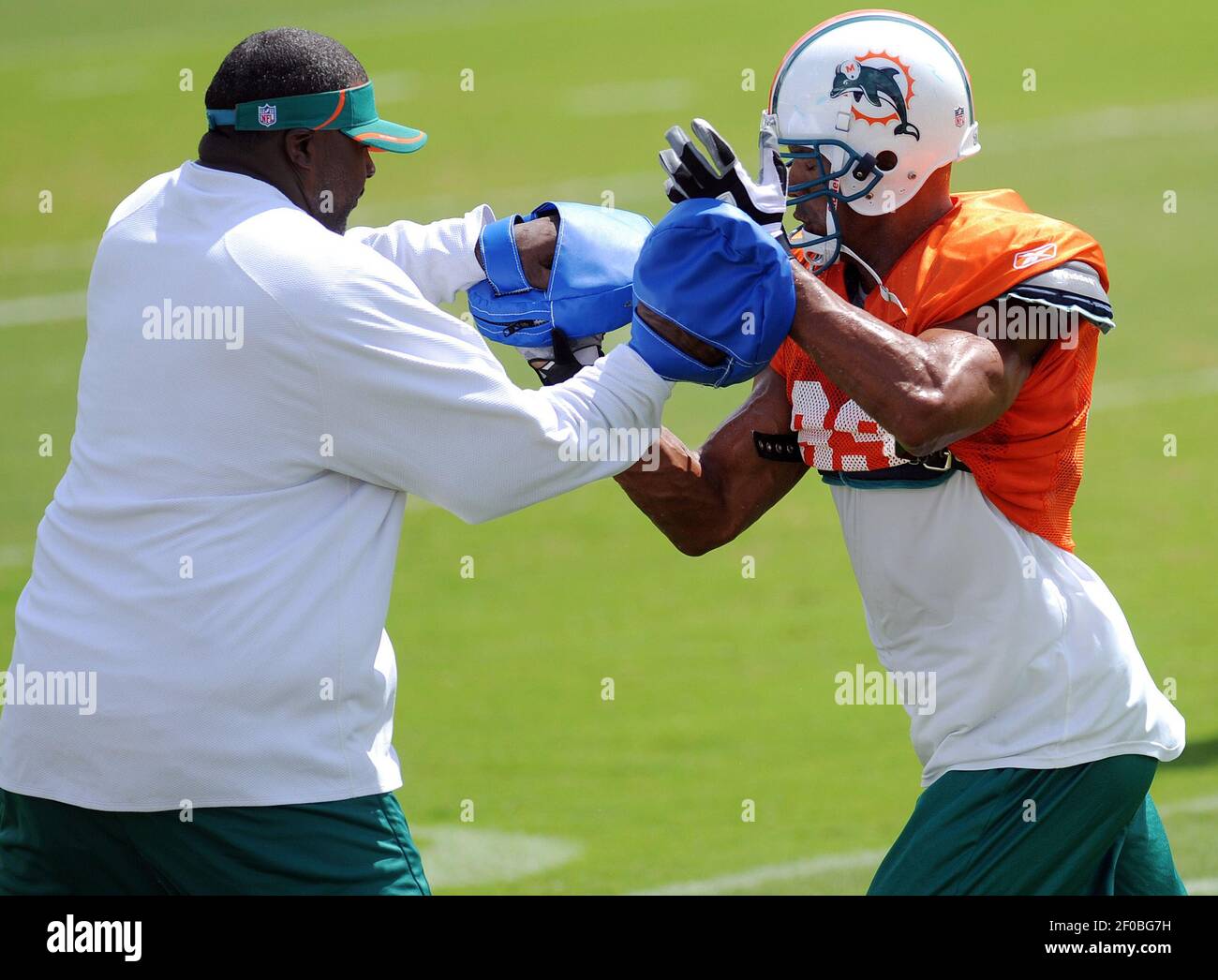 Jason Taylor (99) participates in training exercises at Dolphins camp ...