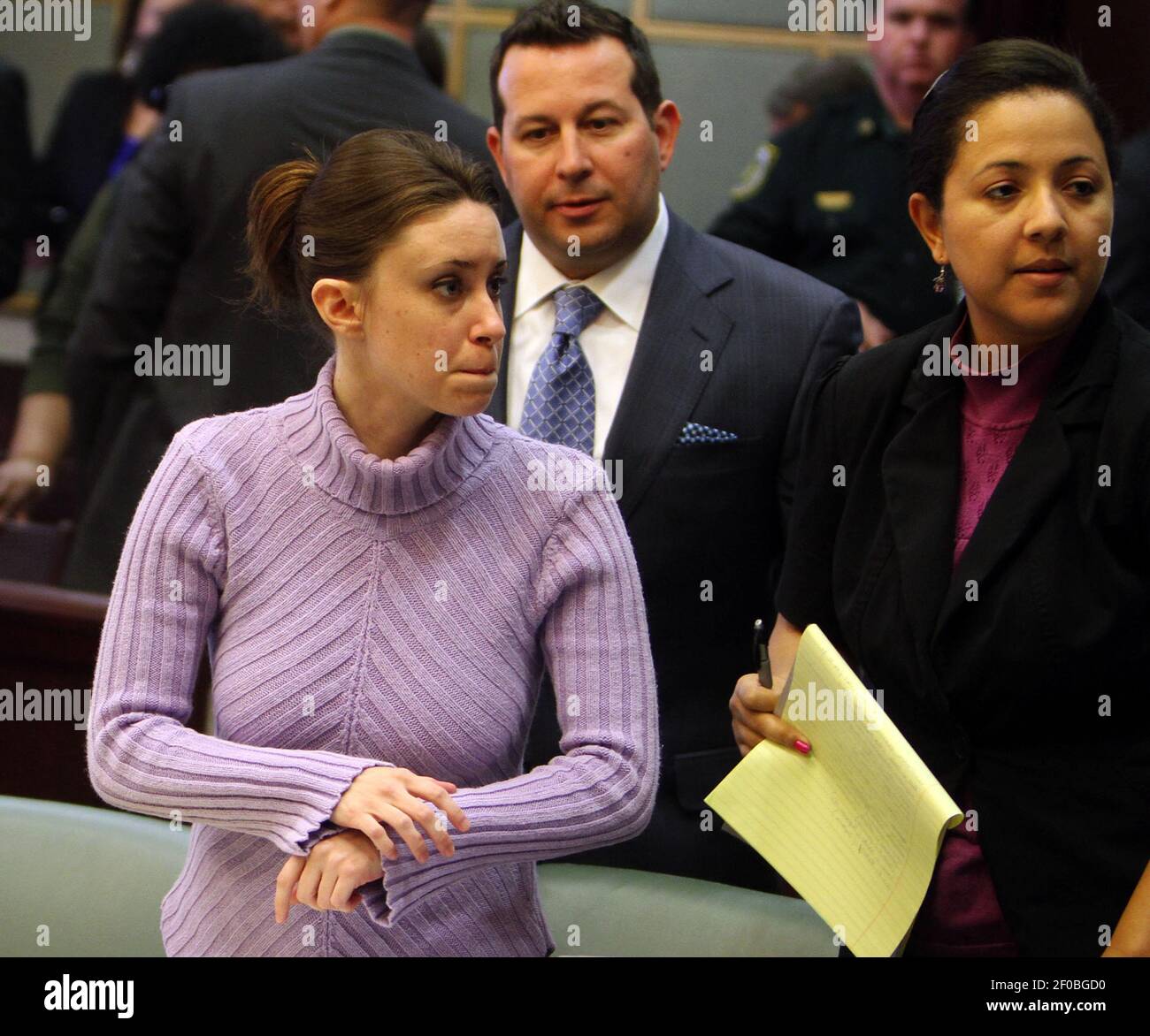 Casey Anthony, left, and her defense team Jose Baez and Michelle Medina ...