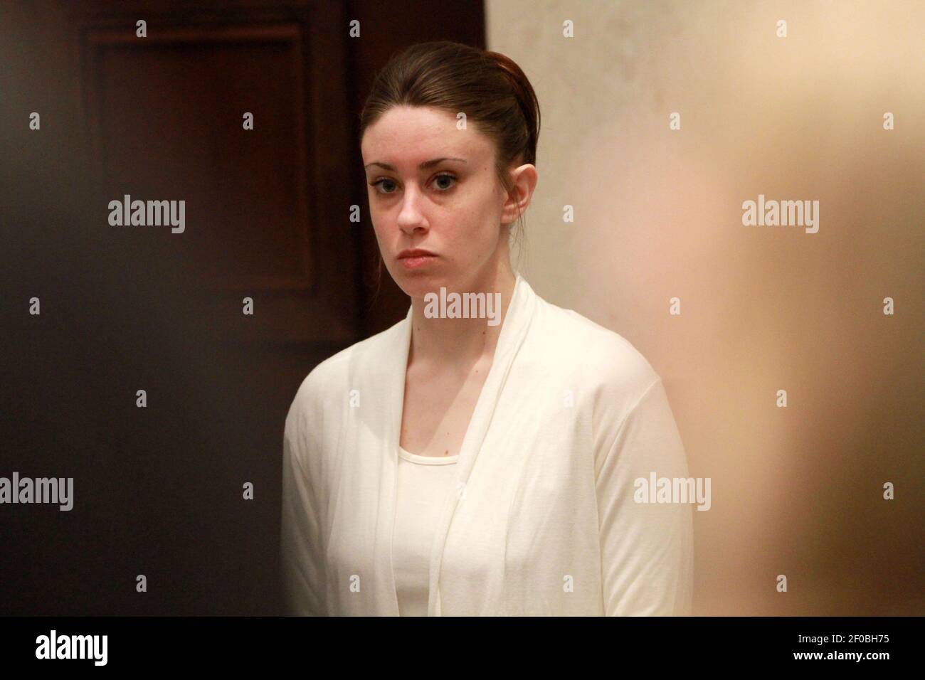 Casey Anthony stands for the arrival of the jury in her murder trial at ...