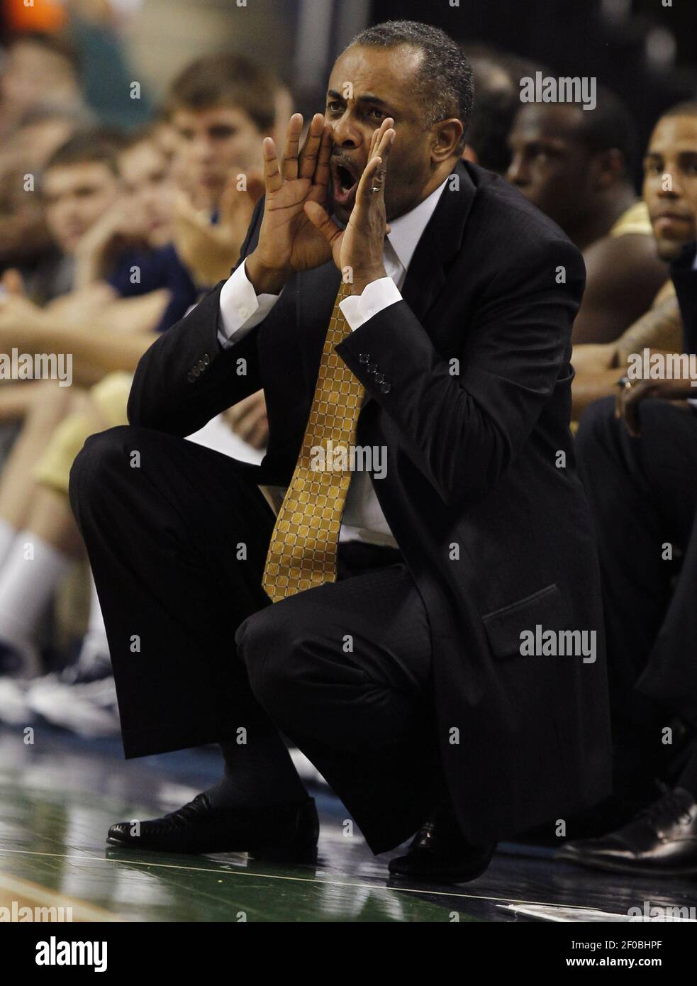 Georgia Tech head coach Paul Hewitt screams instructions to his team in ...
