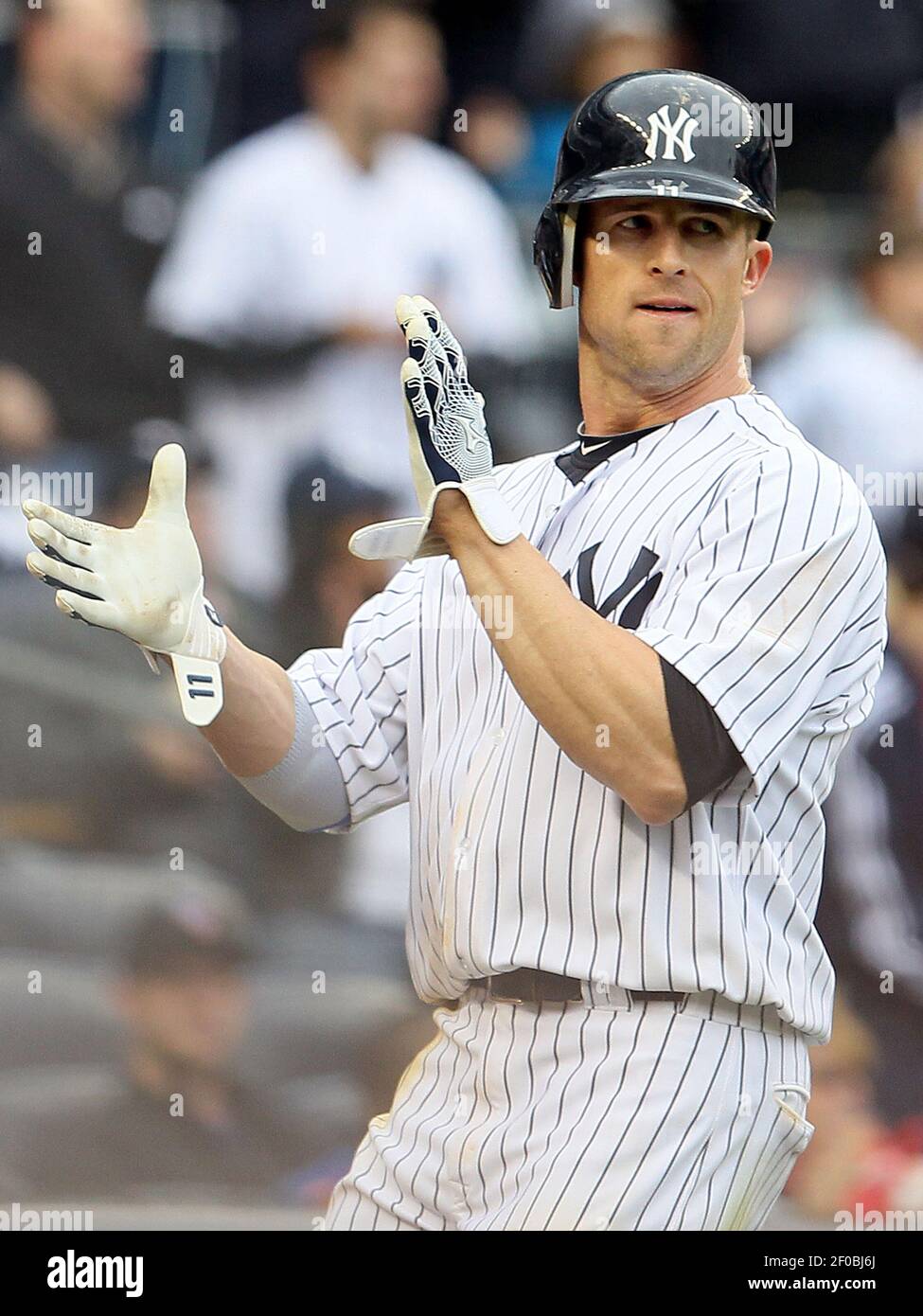 Brett Gardner of the New York Yankees celebrates scoring a seventh ...