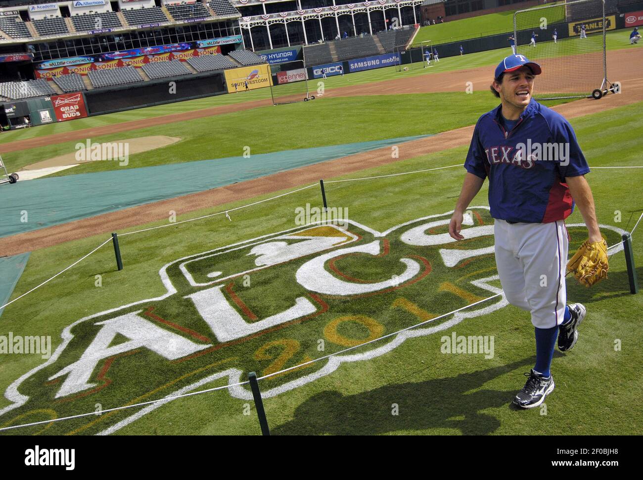 Texas Rangers second baseman Ian Kinsler (5) walks past the ALCS logo ...