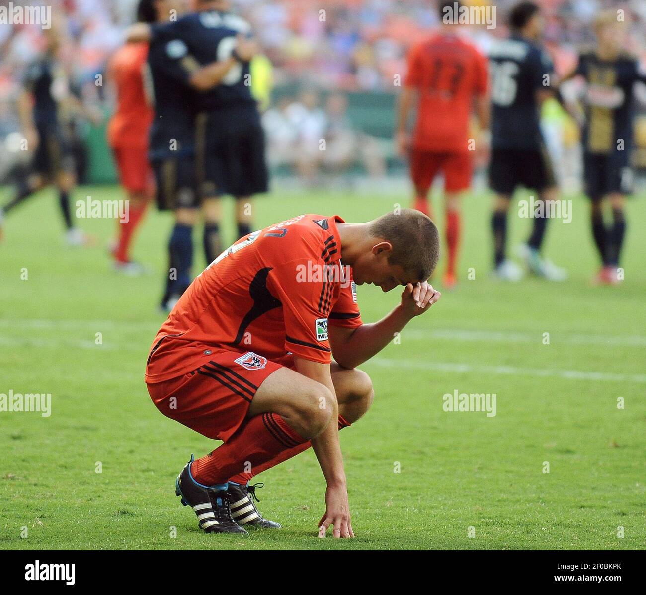 D.C. United defender Perry Kitchen reacts after scoring in his own goal ...