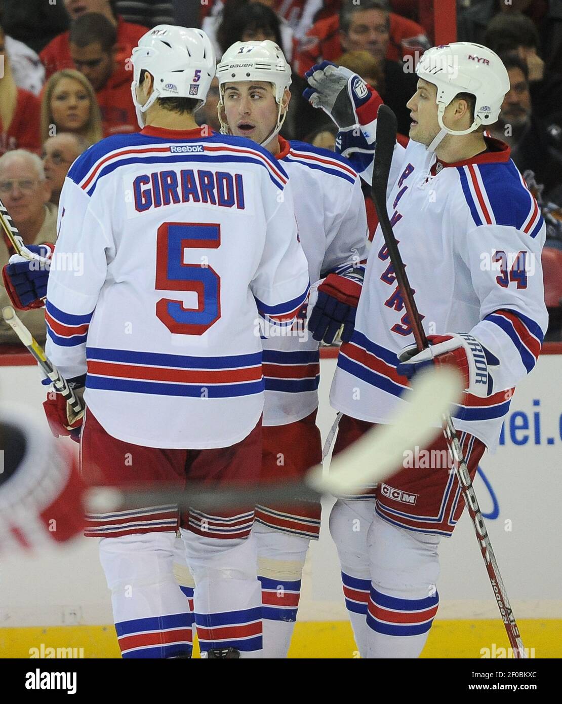 New York Rangers left wing Brandon Dubinsky (17) celebrates with ...
