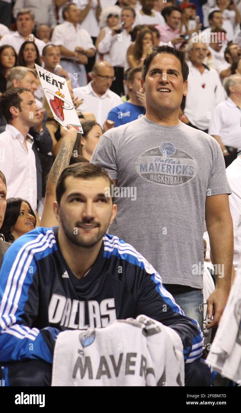Dallas Mavericks owner Mark Cuban looks on behind the Mavericks bench ...