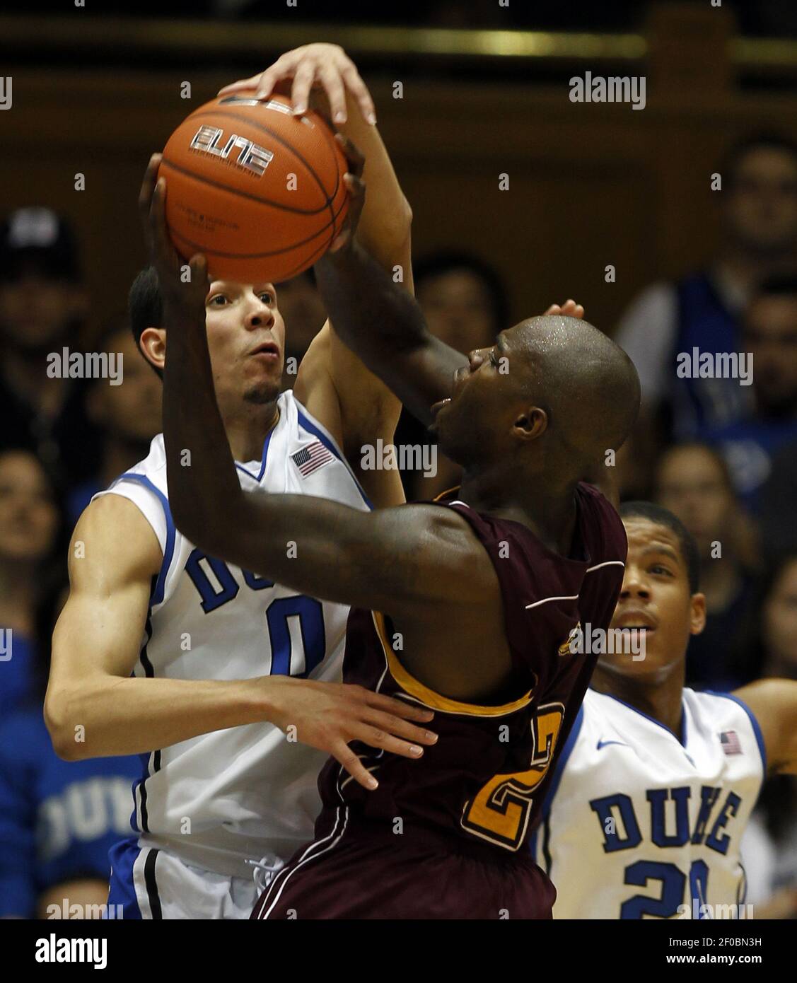 Duke's Austin Rivers (0) blocks a first-half shot by Shaw's Malik Alvin ...