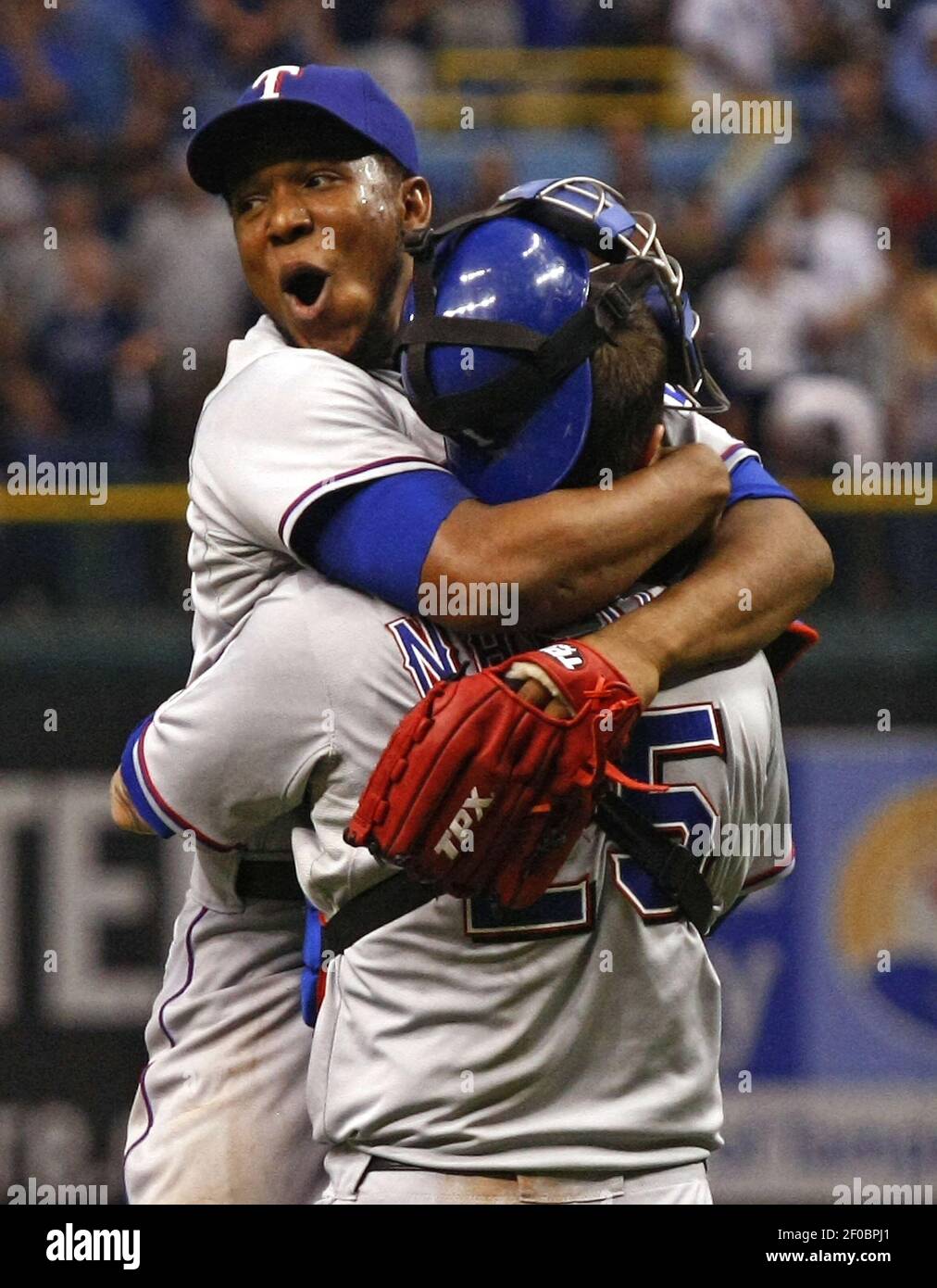 Texas Rangers relief pitcher Neftali Feliz, left, and Texas Rangers ...