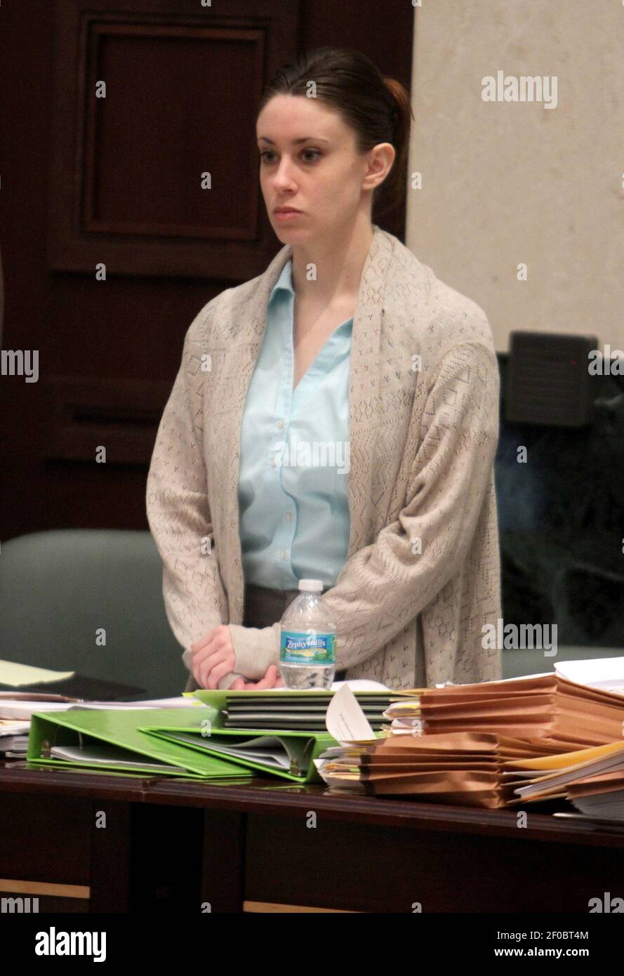 Casey Anthony stands as the jury returns from a recess during her ...