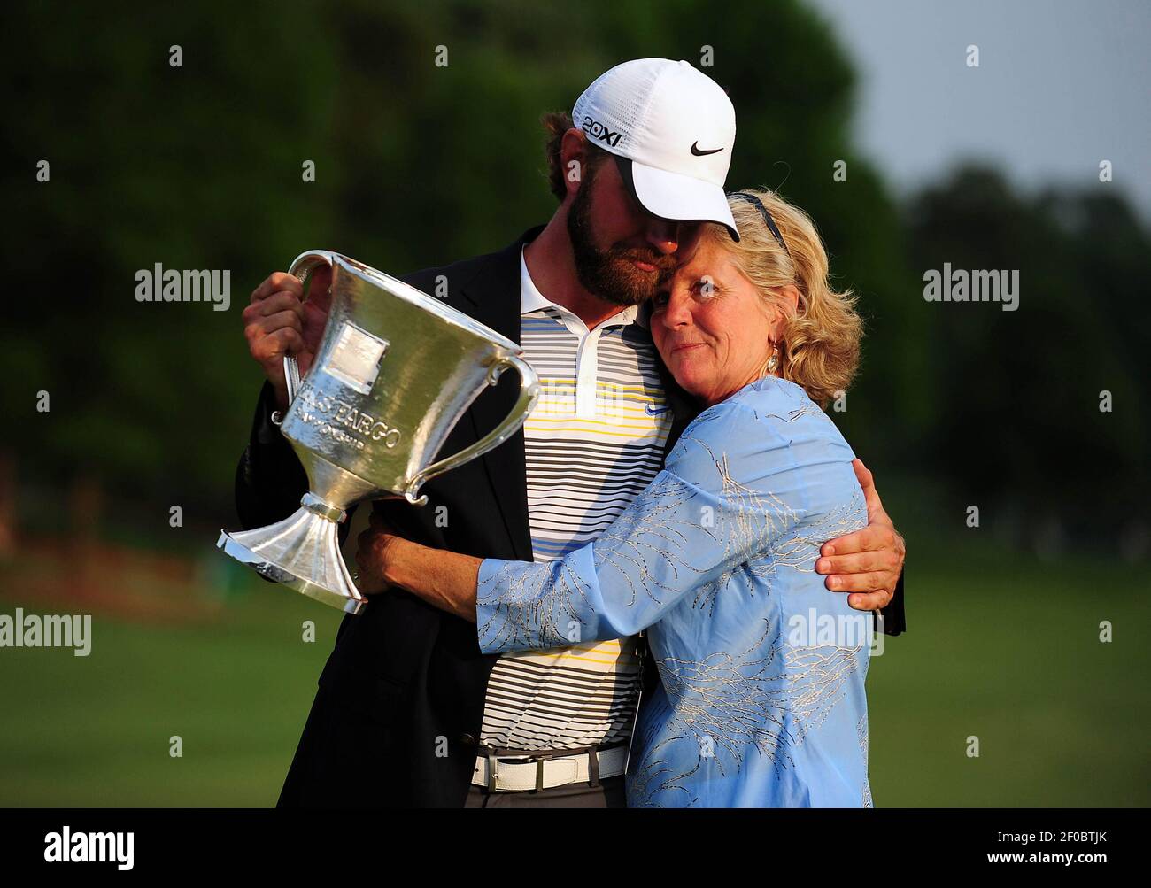 Lucas Glover hugs his mother Hershey Glover after being presented the ...