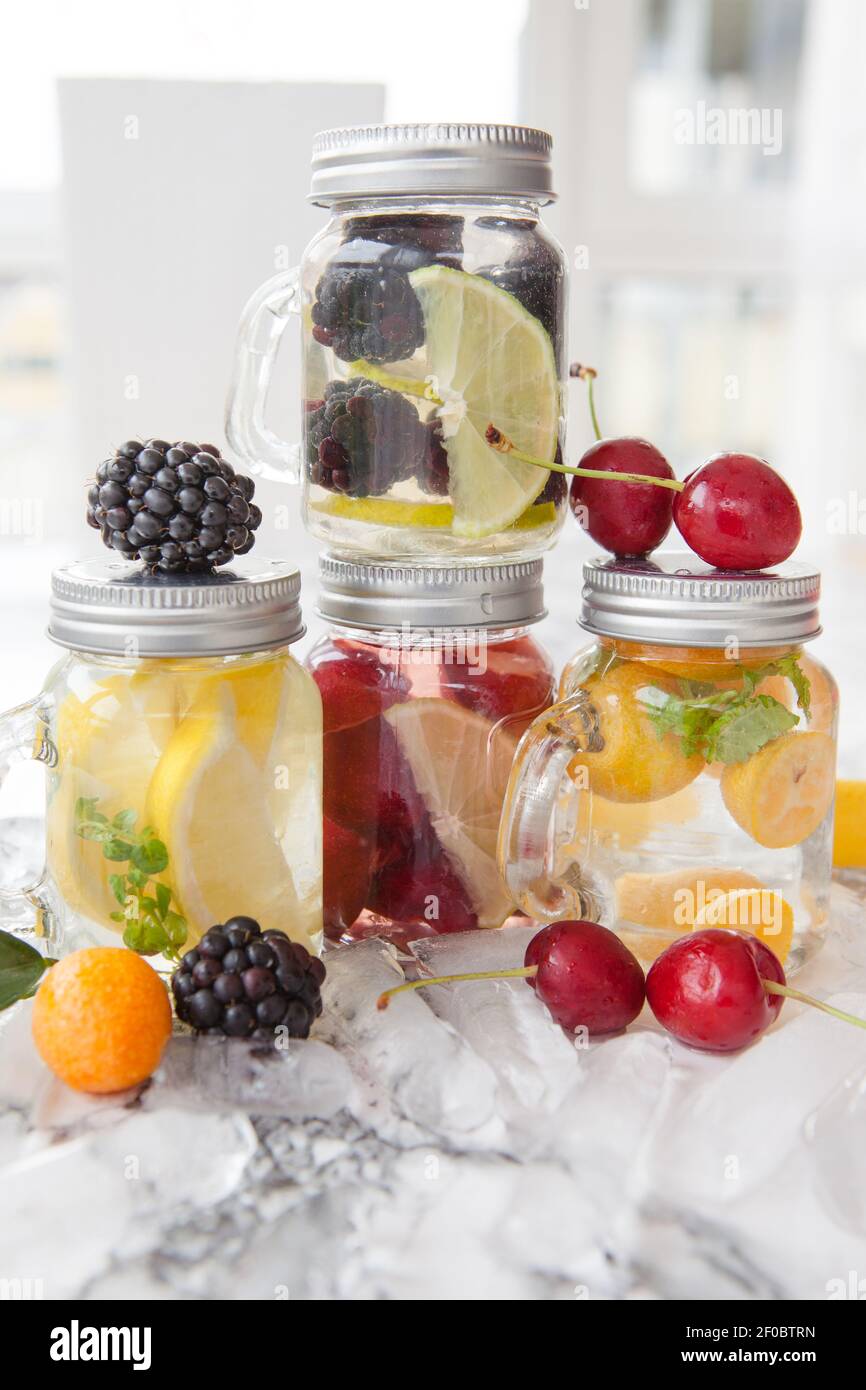 Fresh water with fruits Stock Photo - Alamy