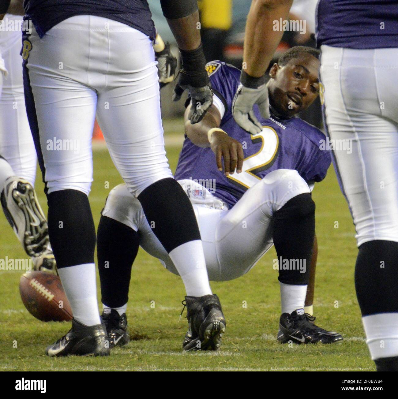 Baltimore Ravens quarterback Tyrod Taylor gets up after being hammered ...